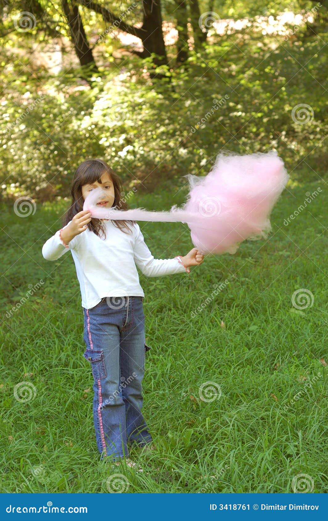 Young girl eating candy stock image. Image of kiddie, adorable - 3418761