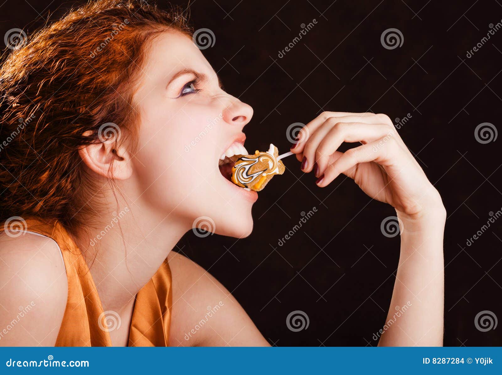 Young girl eating a candy stock photo. Image of hair, lips - 8287284