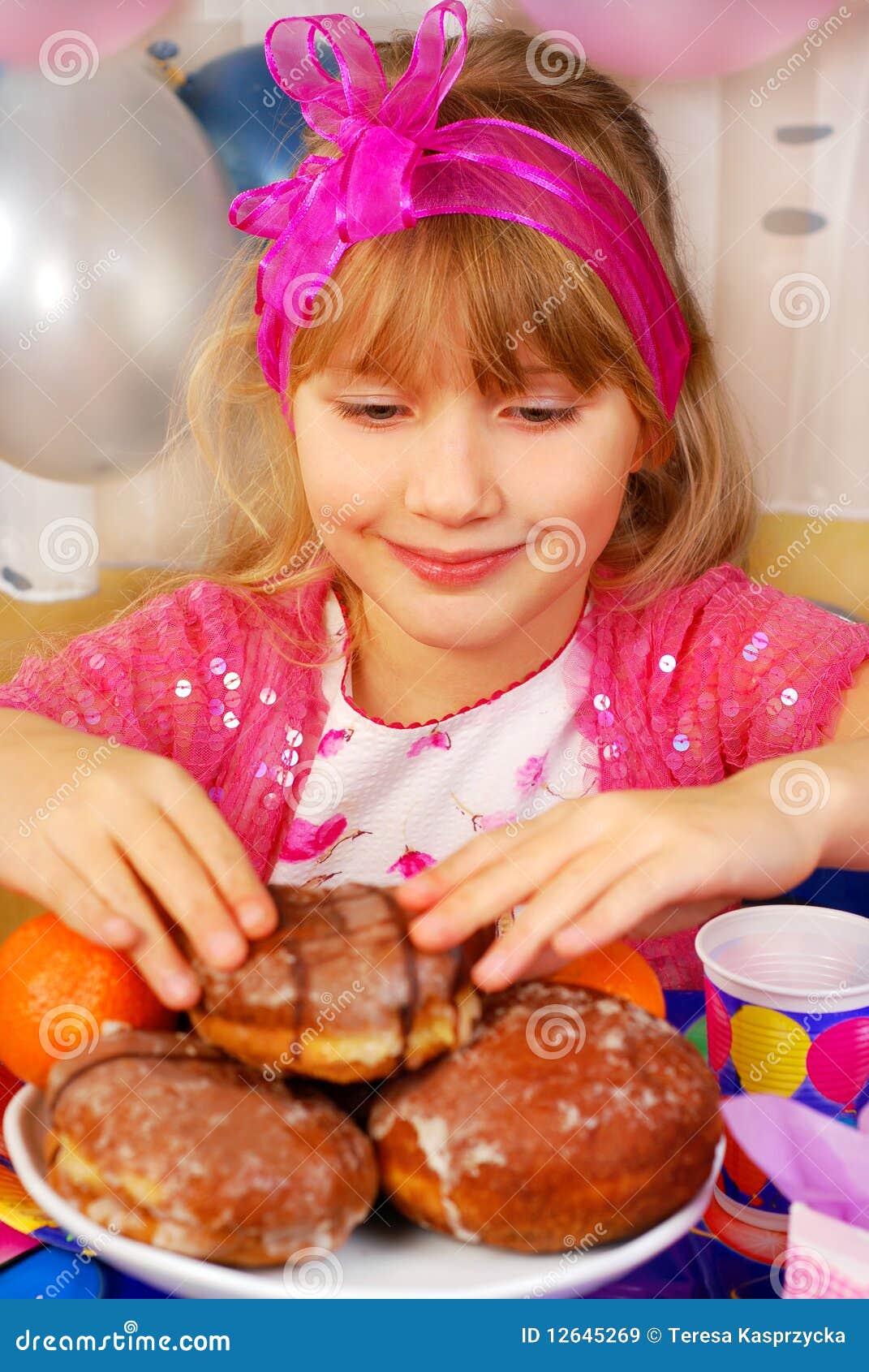Young Girl Eating Donuts on Party Stock Image - Image of delicious ...