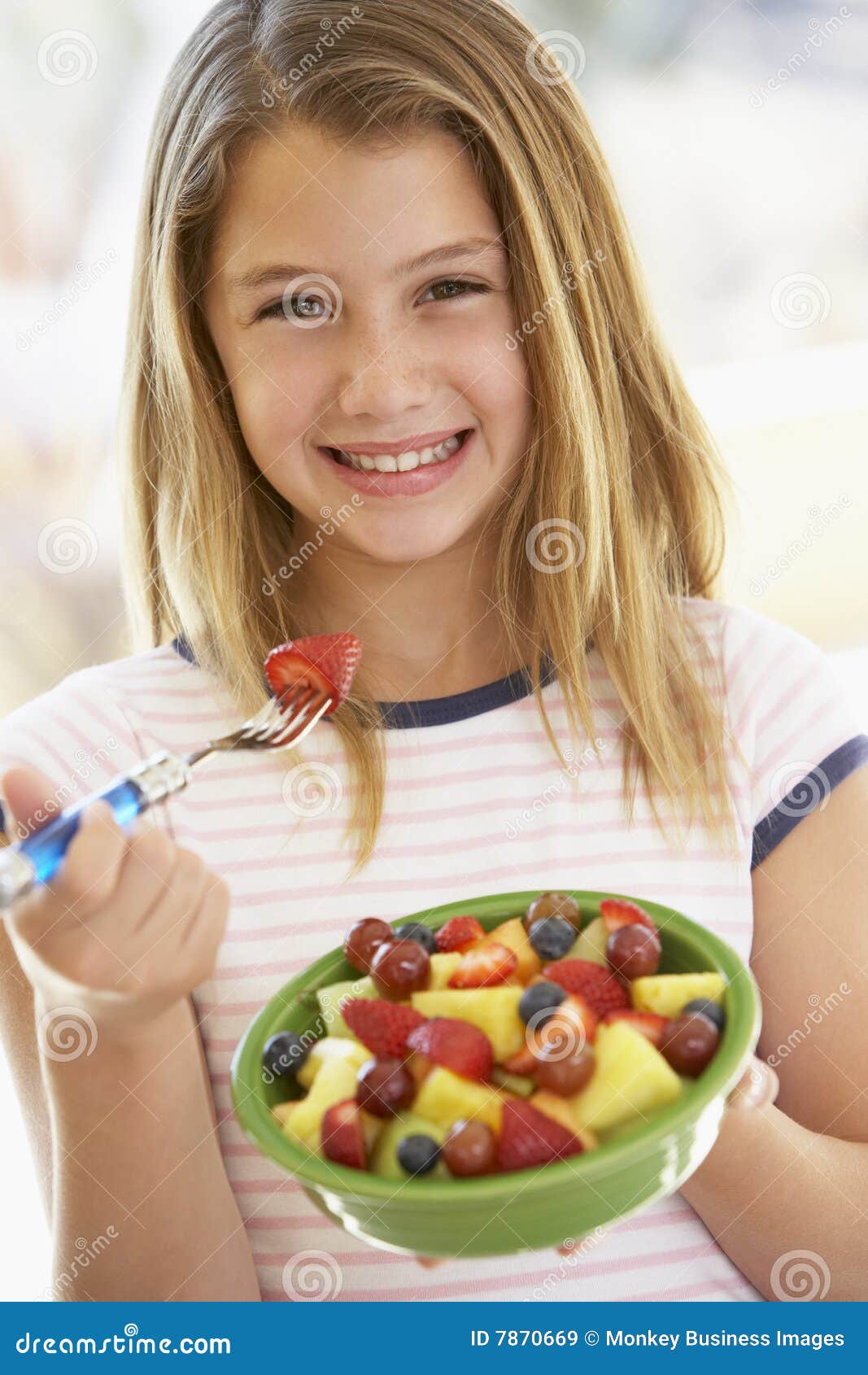 Young Girl Eating Fresh Fruit Salad Stock Image - Image of caucasian ...