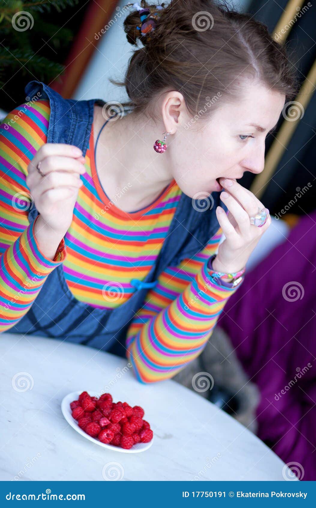 Young Girl Eating Raspberry Stock Image - Image of pink, fruit: 17750191