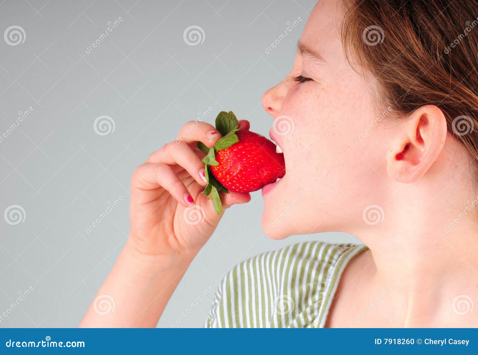Young Girl Eating Strawberry Stock Photo - Image of young, child: 7918260