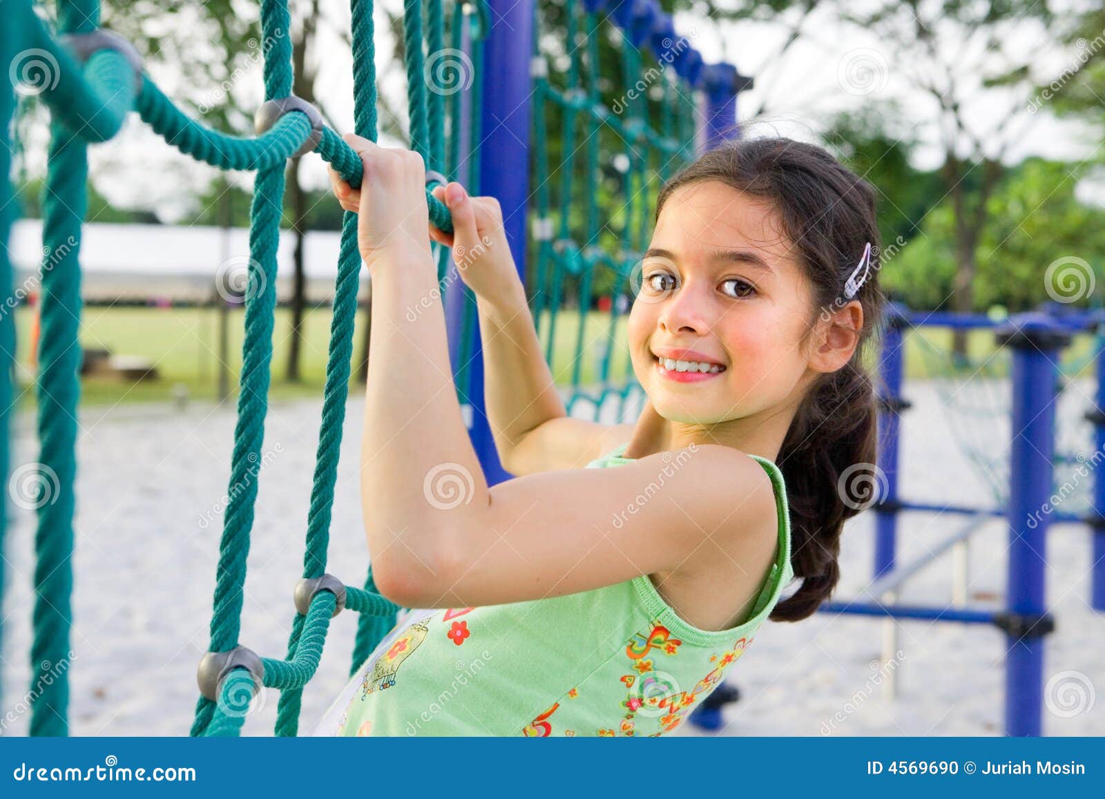 Young Girl Enjoying the Climbing Rope Stock Photo - Image of joyful ...