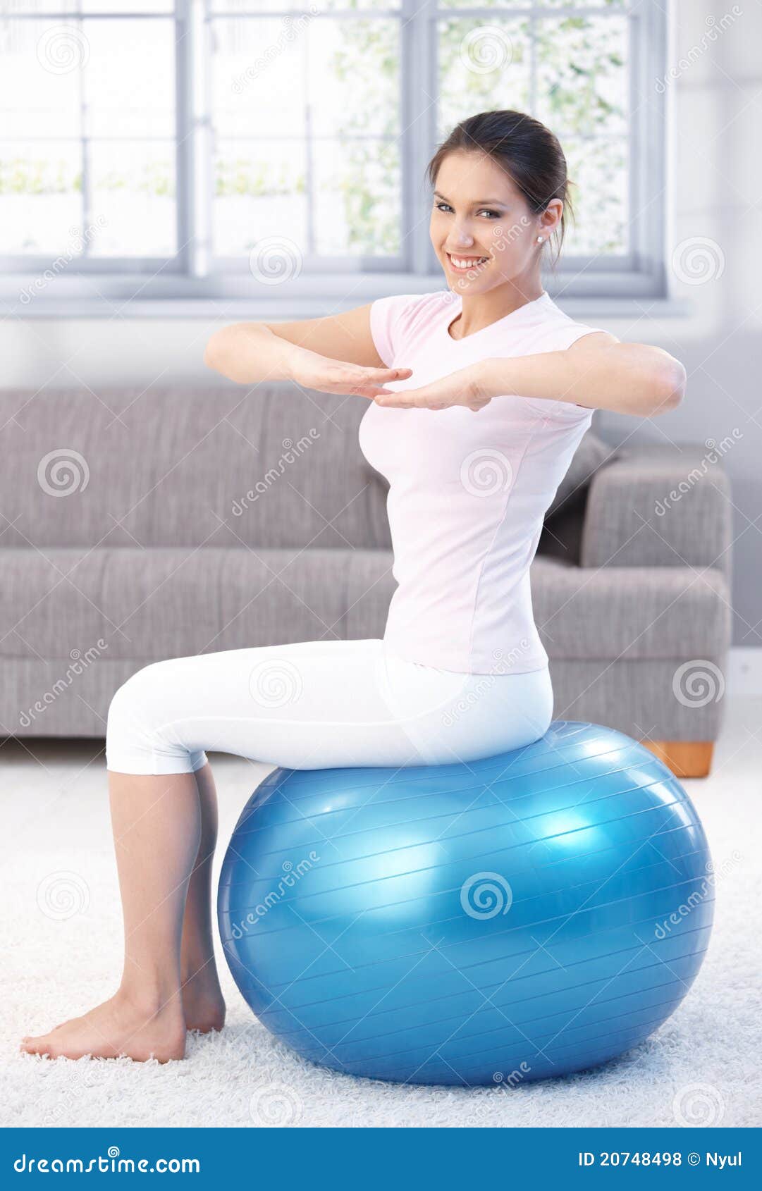 Young Girl Exercising on Fit Ball Smiling Stock Photo - Image of ball ...