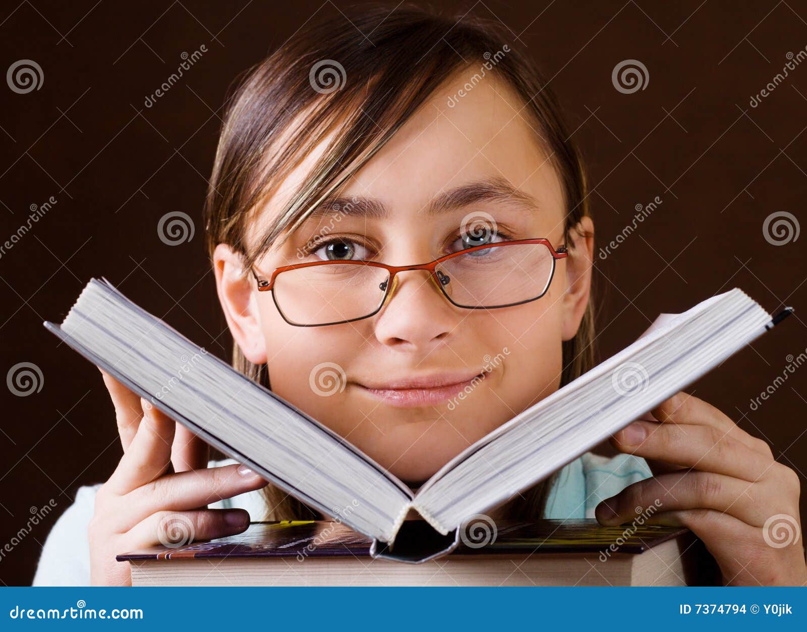 Young Girl Face with an Open Book Stock Photo - Image of looking ...