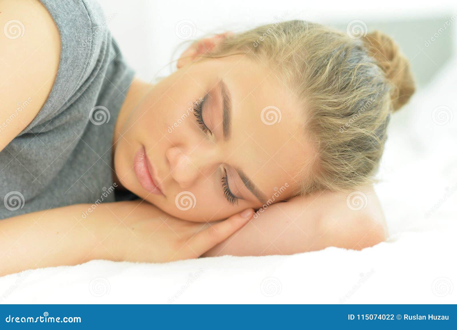 Girl sleeping on a pillow stock photo. Image of smile - 115074022
