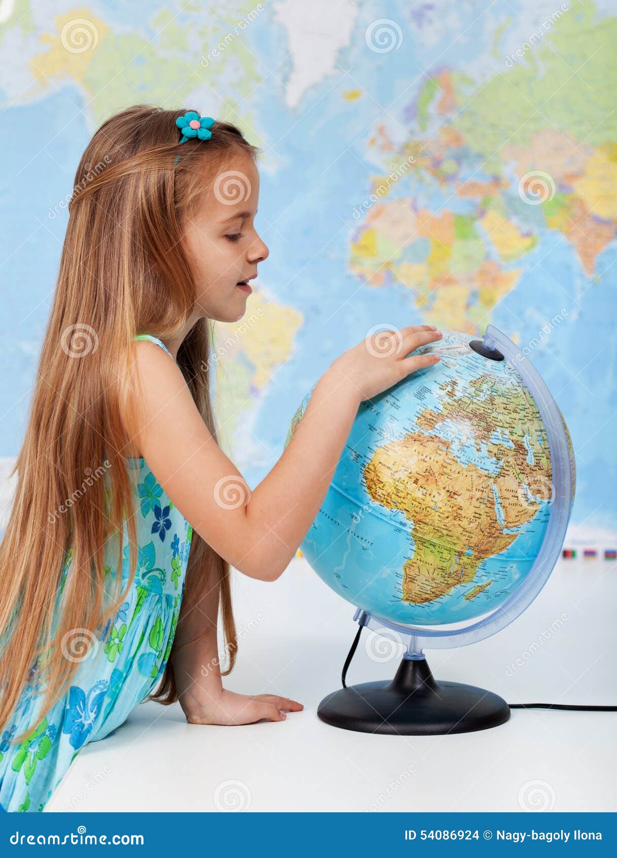 Young Girl Finding Places on a Globe Stock Photo - Image of expression ...