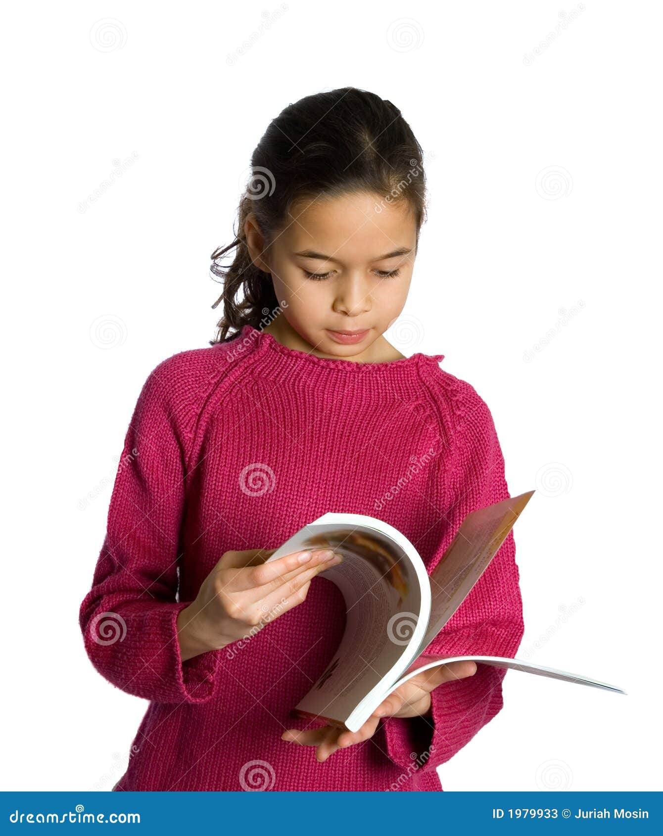 A Young Girl Flipping through Her Book Stock Image - Image of paper ...