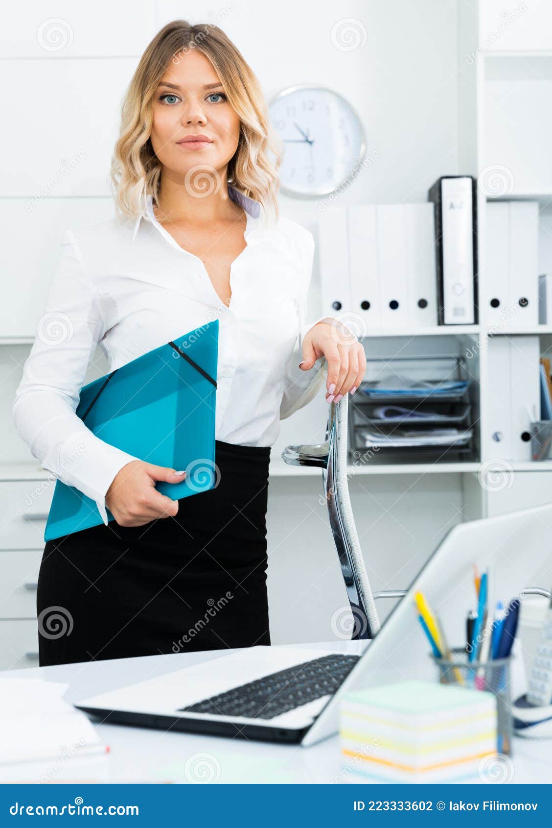 Young Girl with Folder of Documents is Standing in Modern Office Stock ...
