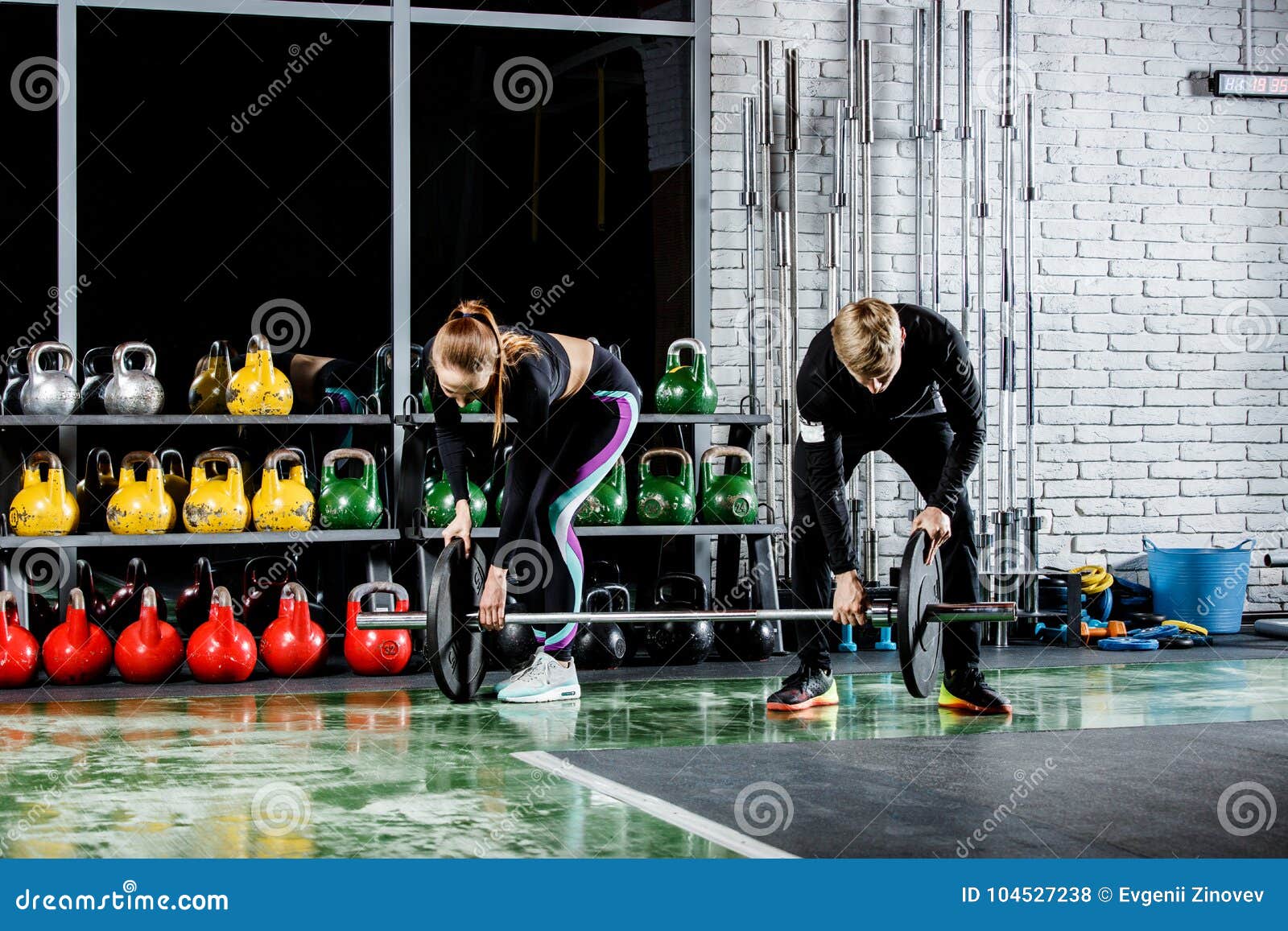 The Girl is Getting Ready for the Exercise with the Trainer Stock Photo ...