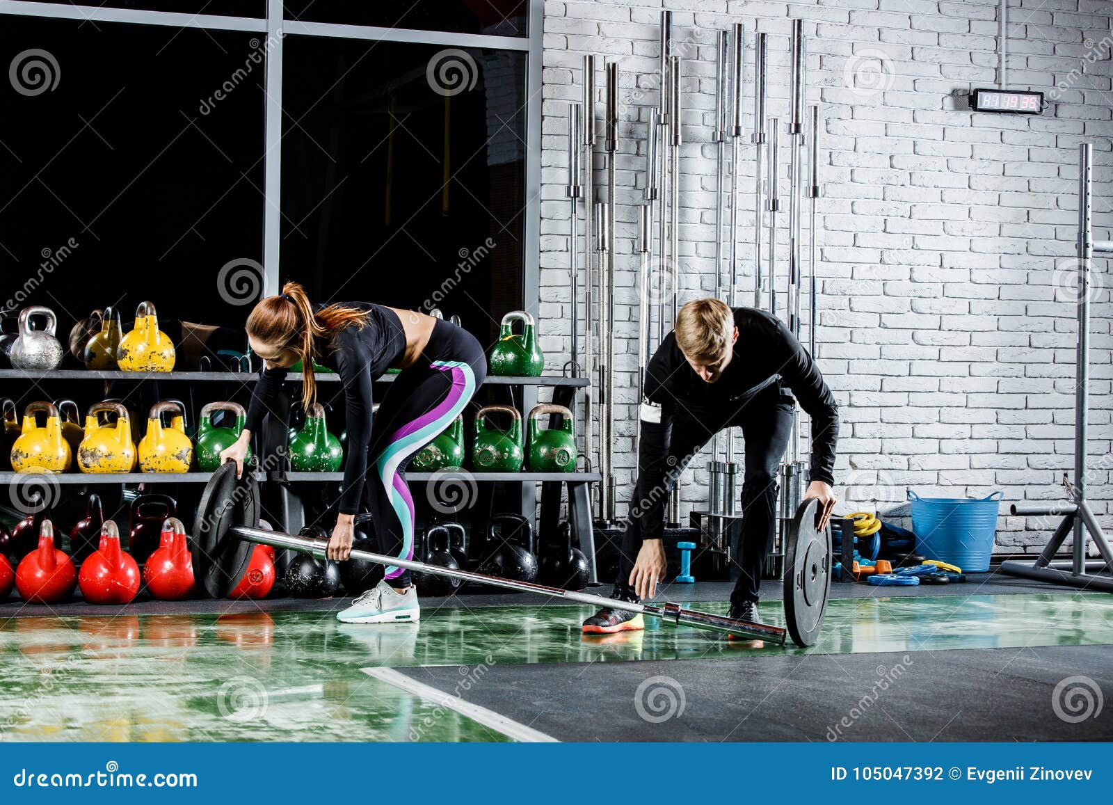 The Girl is Getting Ready for the Exercise with the Trainer Stock Photo ...