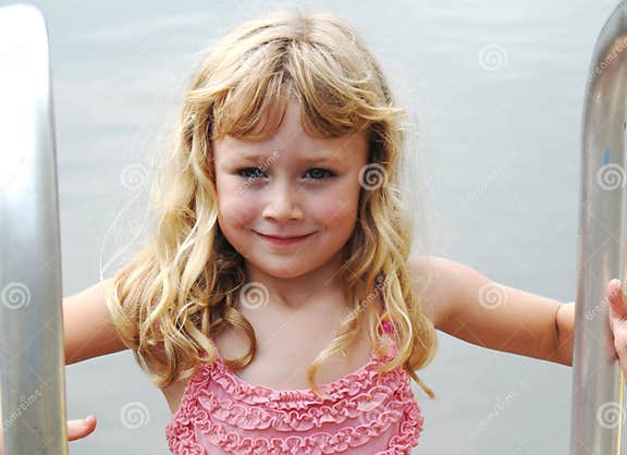 Young Girl Getting into Water Stock Image - Image of nature, activity ...