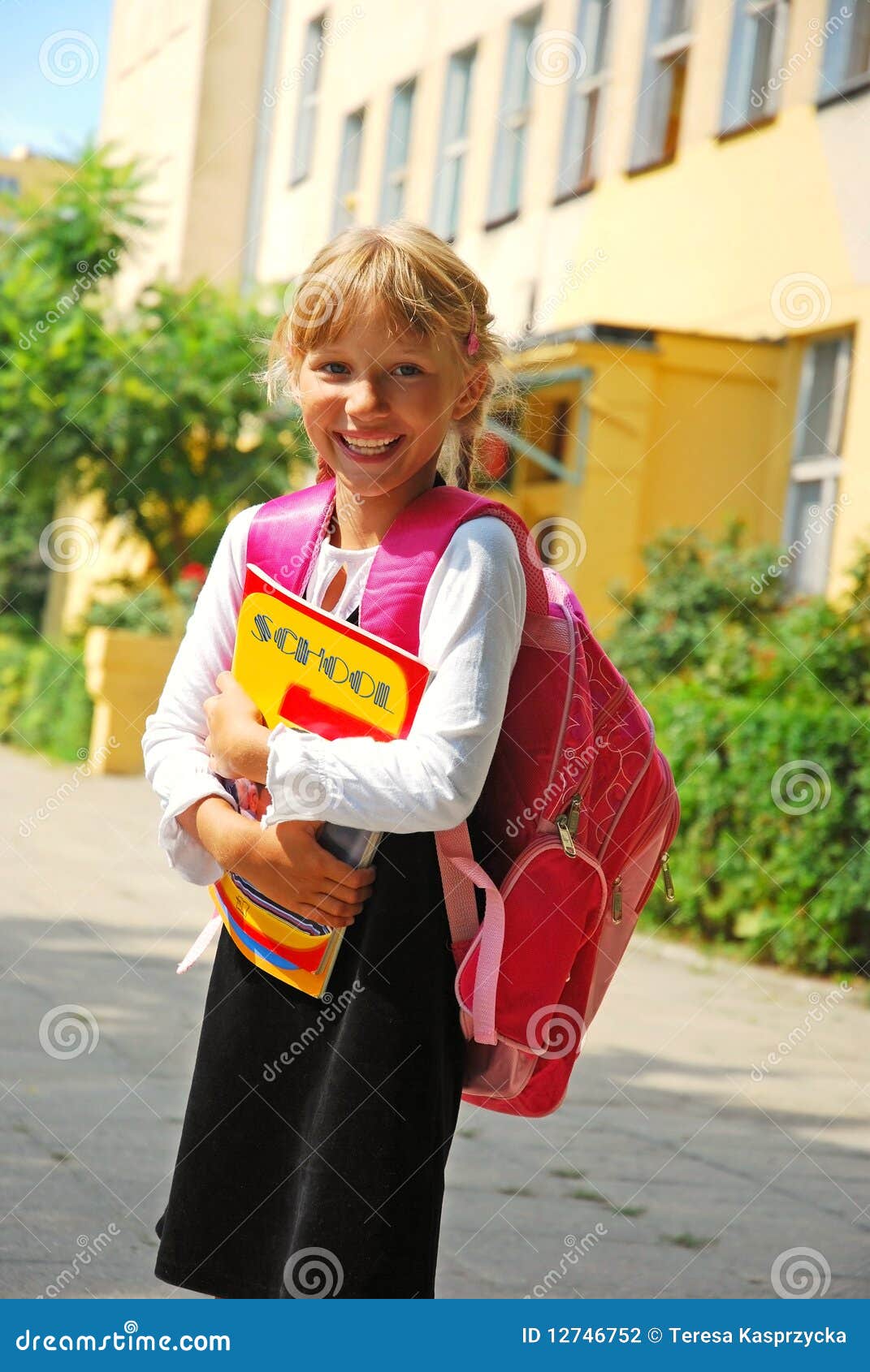 Young girl going to school stock photo. Image of book - 12746752