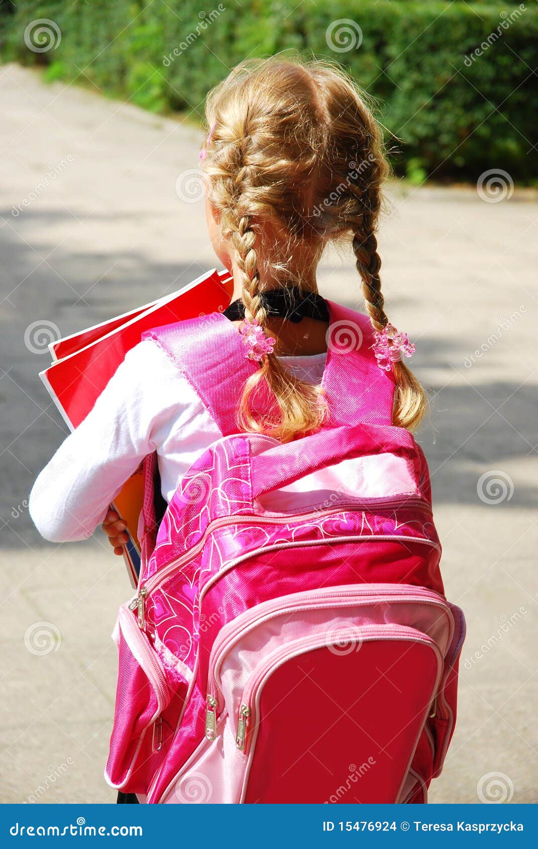 Young girl going to school stock photo. Image of girl - 15476924