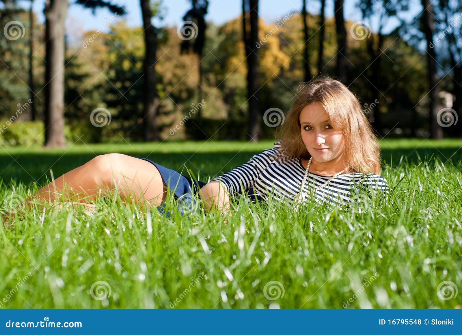 Young girl on the grass stock photo. Image of lawn, love - 16795548