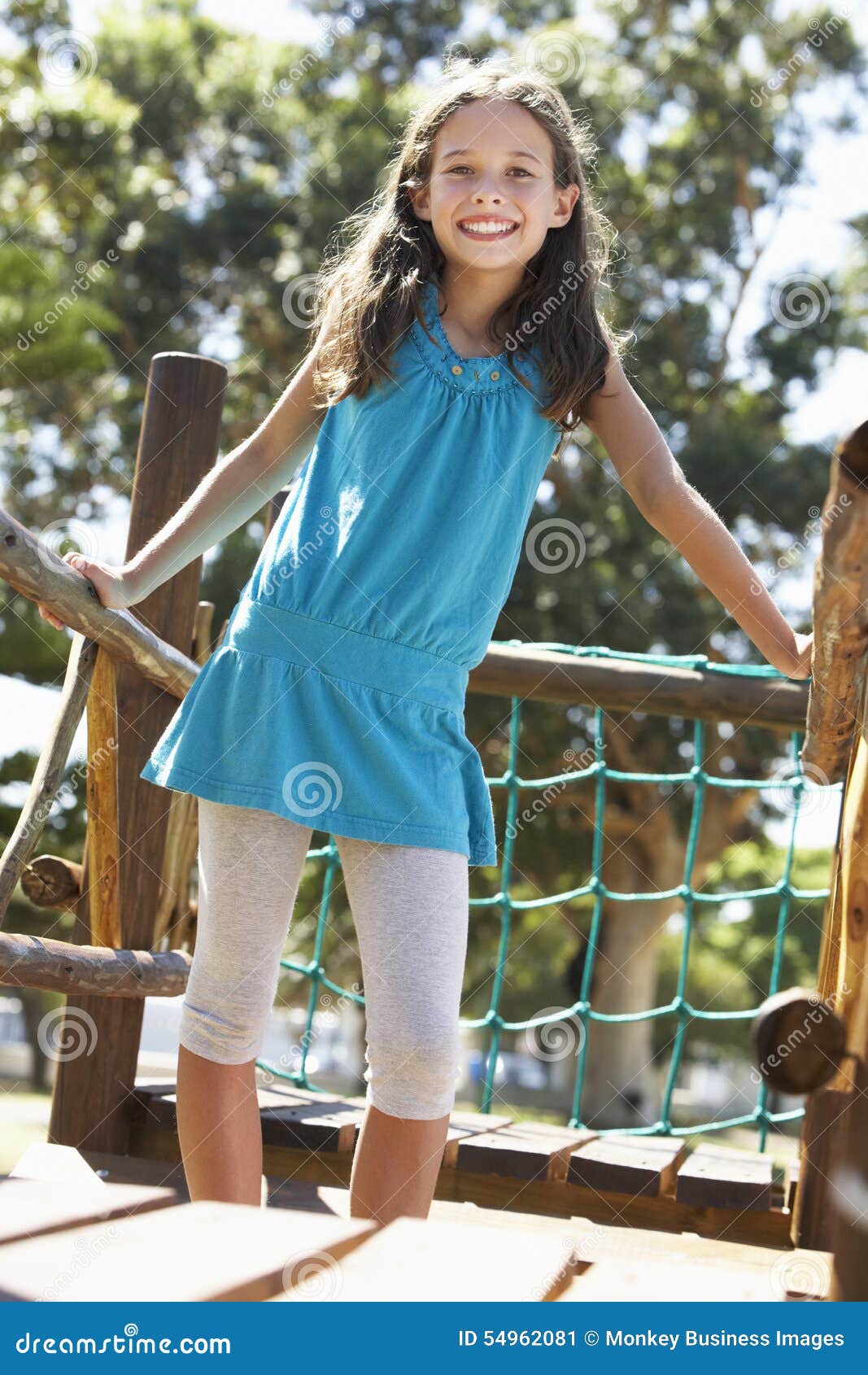 Young Girl Having Fun on Climbing Frame Stock Image - Image of looking ...