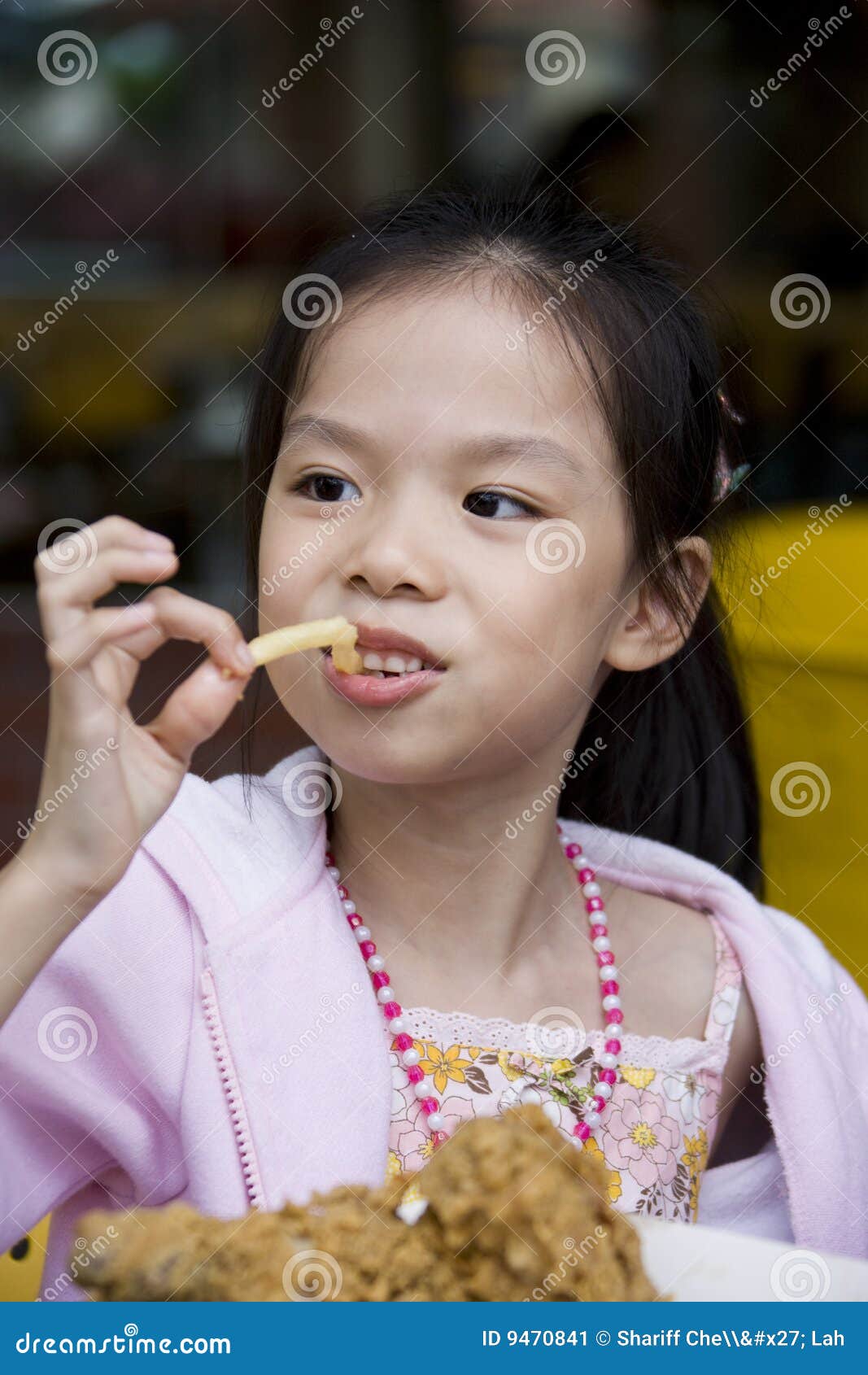 Young Girl Having Fun Eating Stock Image - Image of happy, food: 9470841