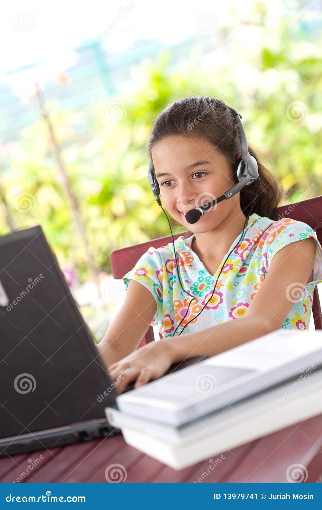 Young Girl with Headset and Using the Laptop Stock Image - Image of ...