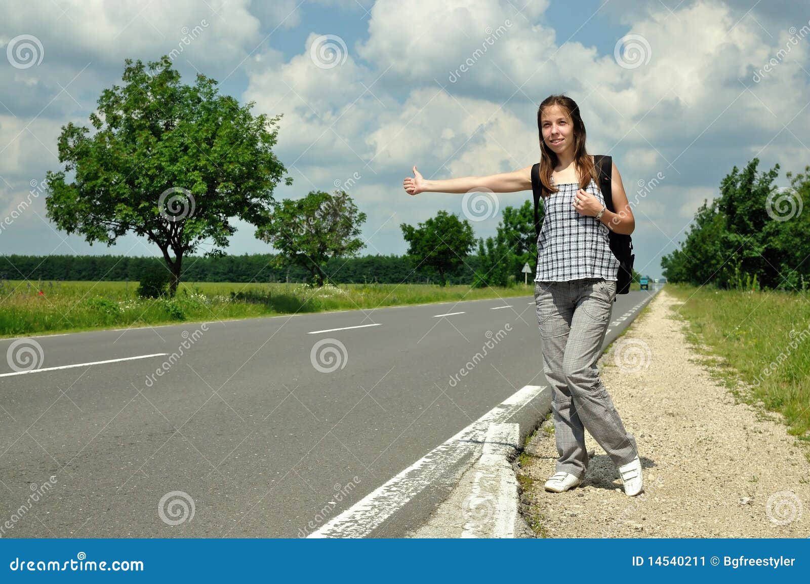 Young Girl Hitchhiking On The Road Stock Image Image Of Clouds