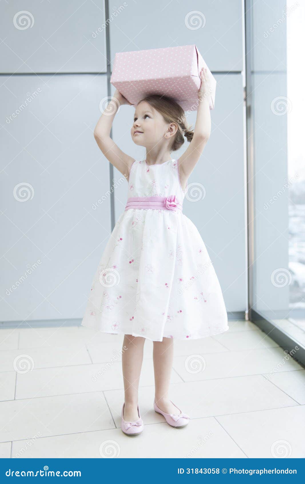 Young Girl Holding Two Gift Wrapped Boxes Stock Photo - Image of ...