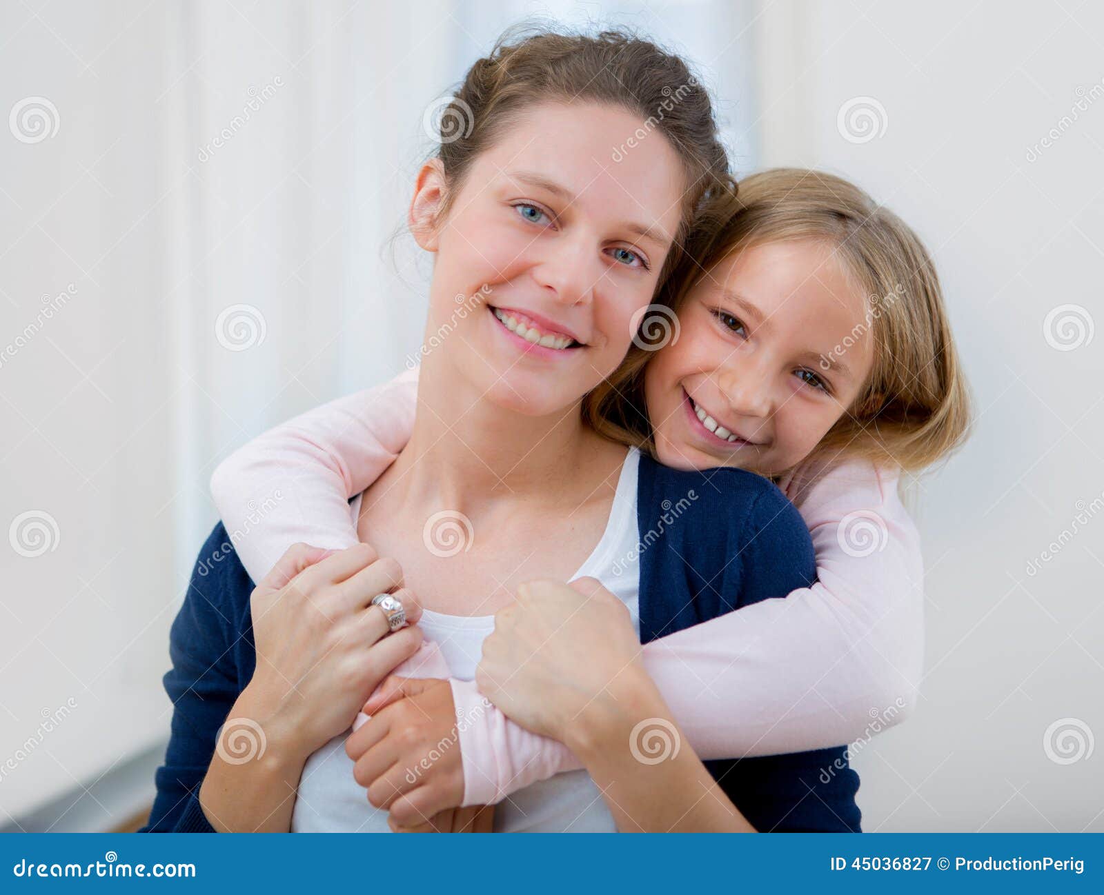 Young Girl Hugging His Sister Stock Image - Image of hugging, smile ...