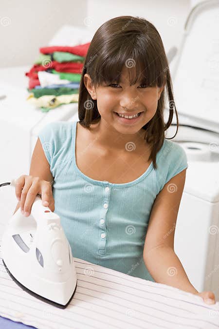Young Girl Ironing stock image. Image of elementary, housework - 6881873