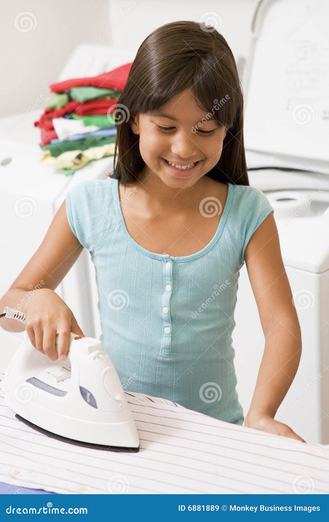 Young Girl Ironing stock image. Image of elementary, happy - 6881889