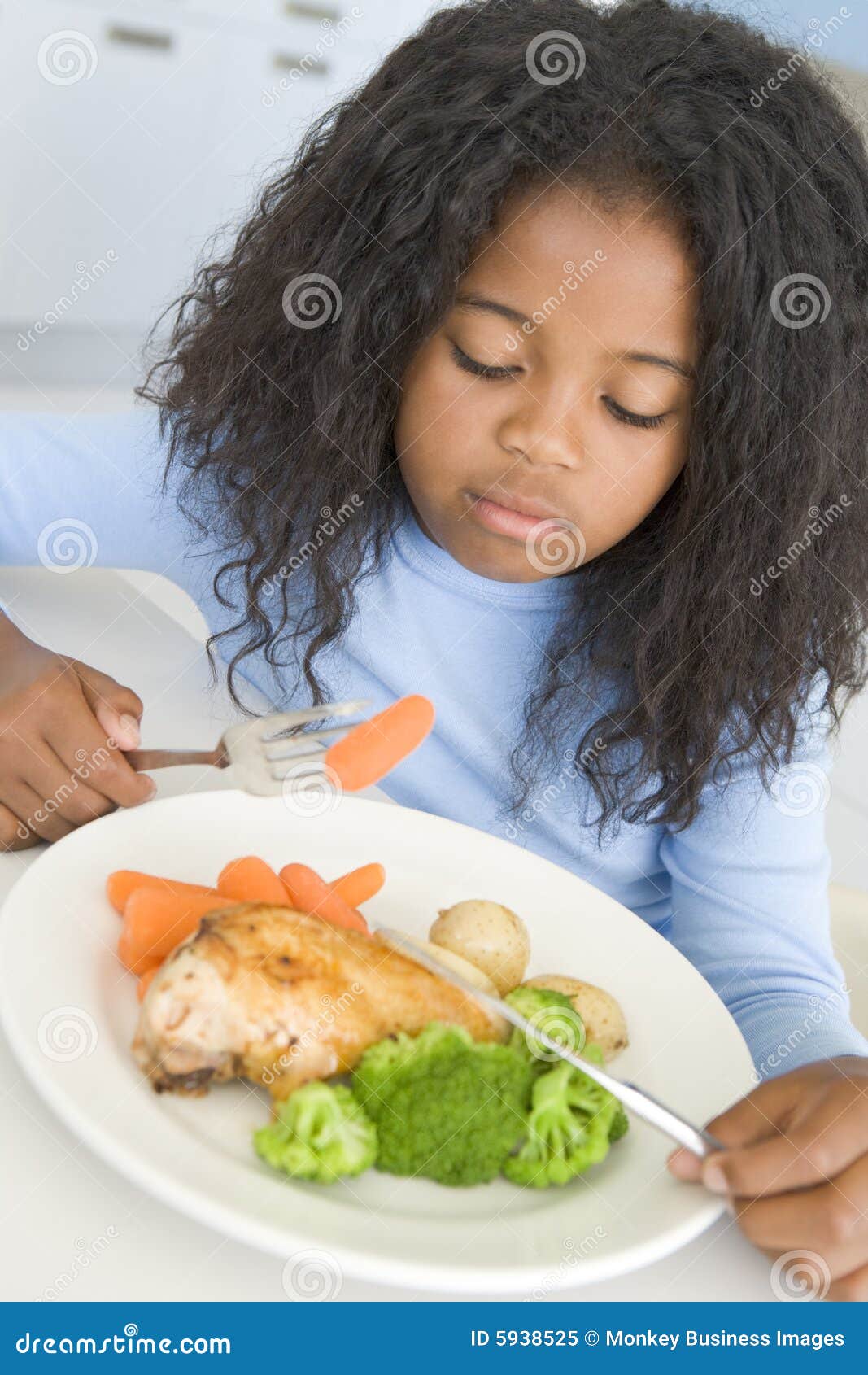 Young Girl in Kitchen Eating Chicken and Vegetable Stock Image - Image ...