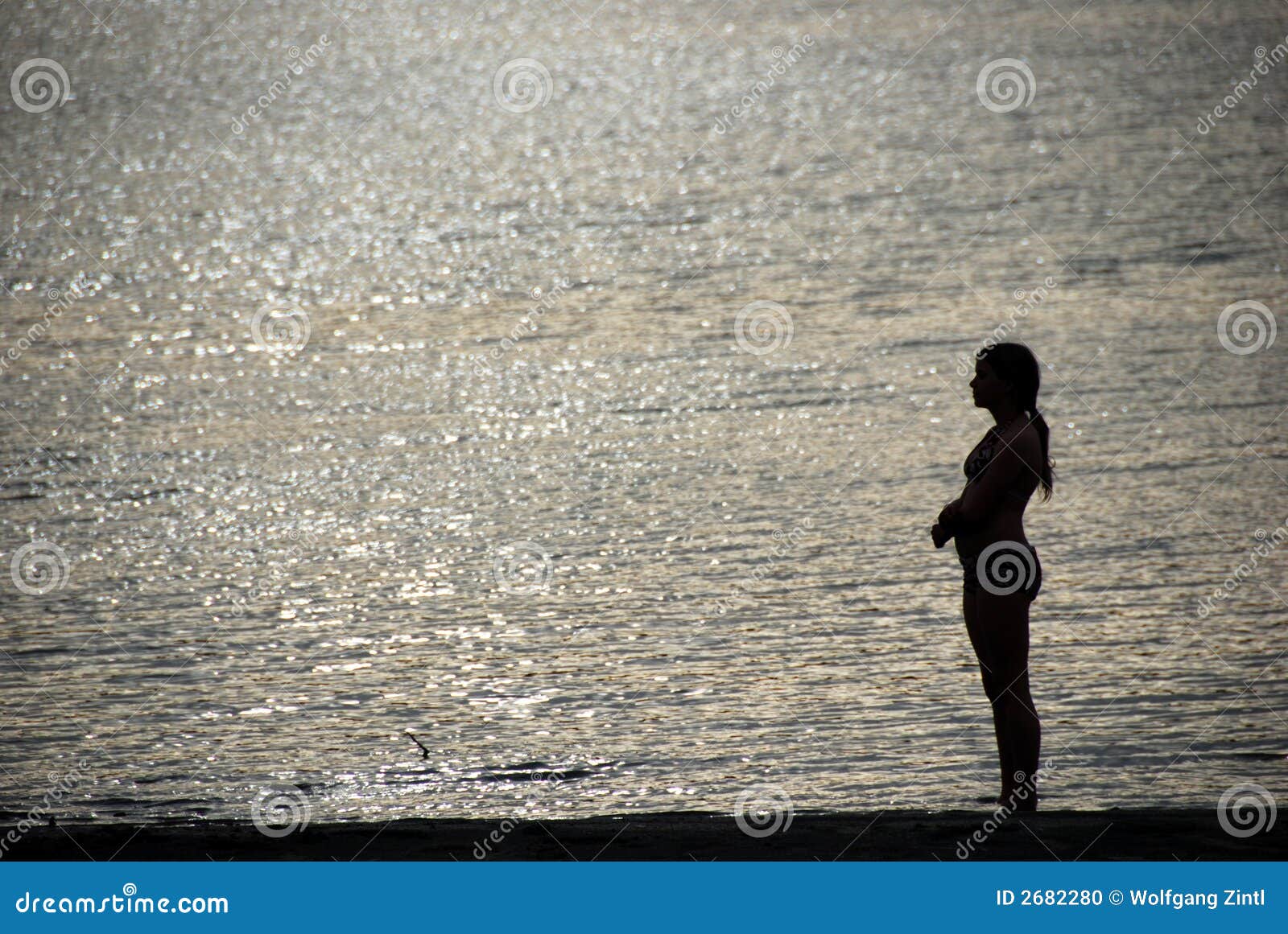 Young girl on the lake stock photo. Image of nature, sunset - 2682280