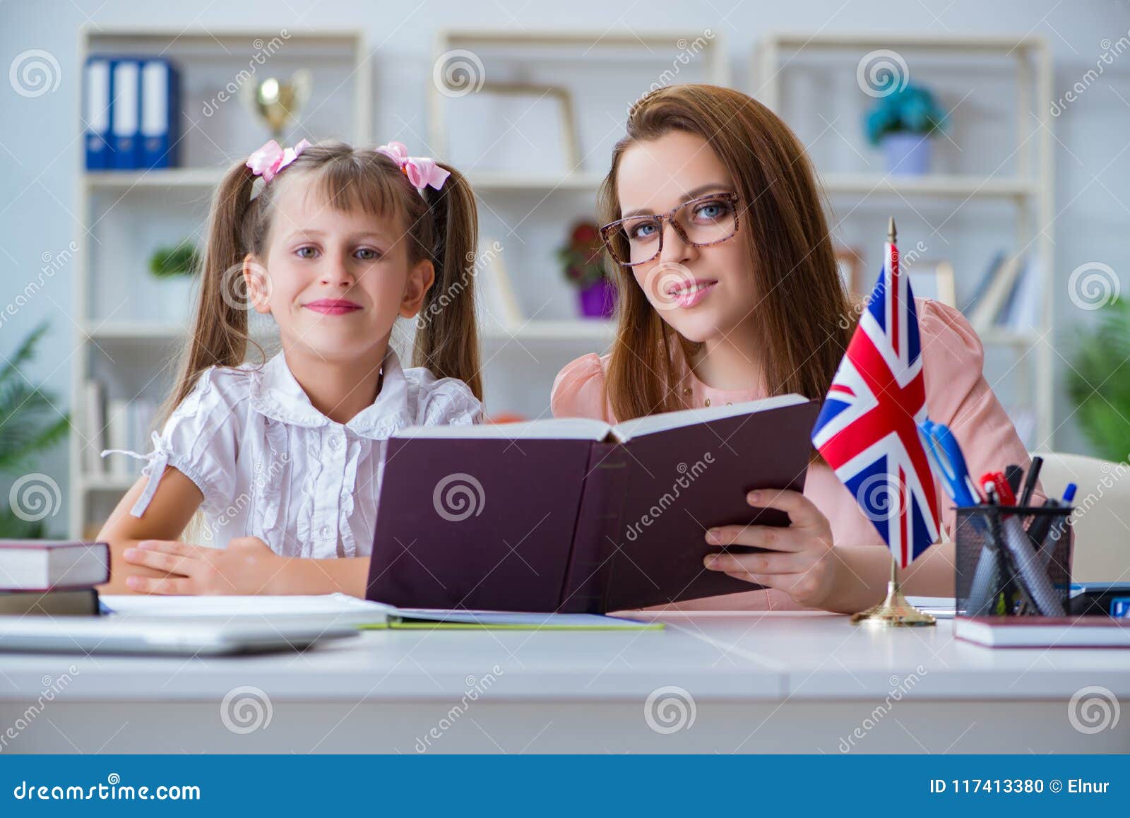 The Young Girl Learning English with Teacher Stock Photo - Image of ...