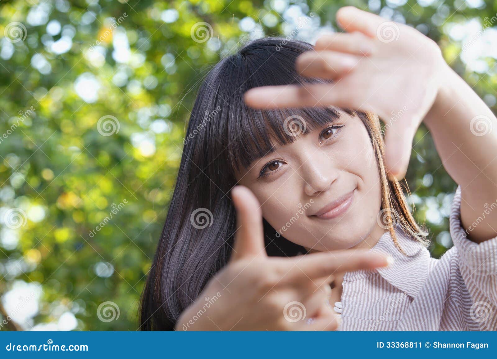 Young Girl Looking at the Camera Stock Image - Image of park, nature ...