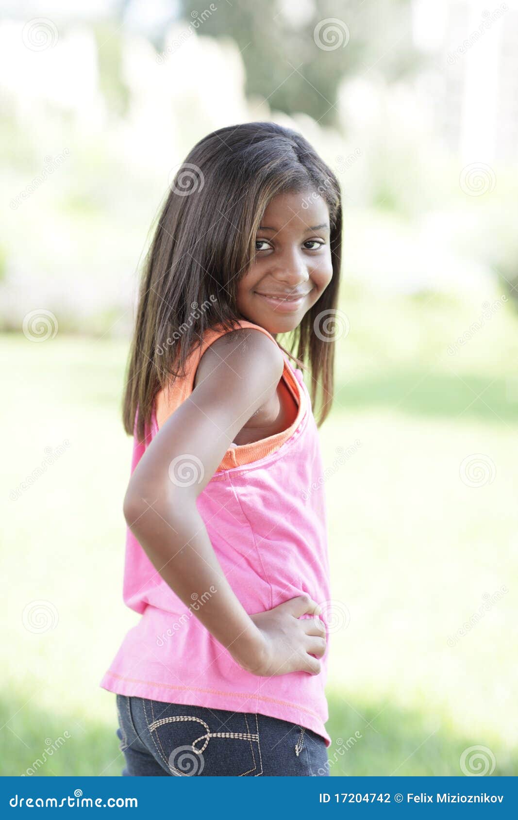 Young Girl Looking Over Her Shoulder Stock Photo - Image of american ...