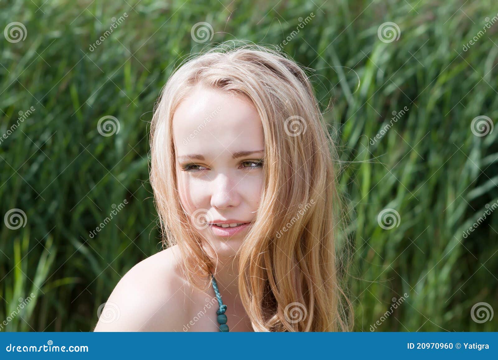 A Young Girl Looks into the Distance Stock Photo - Image of park ...
