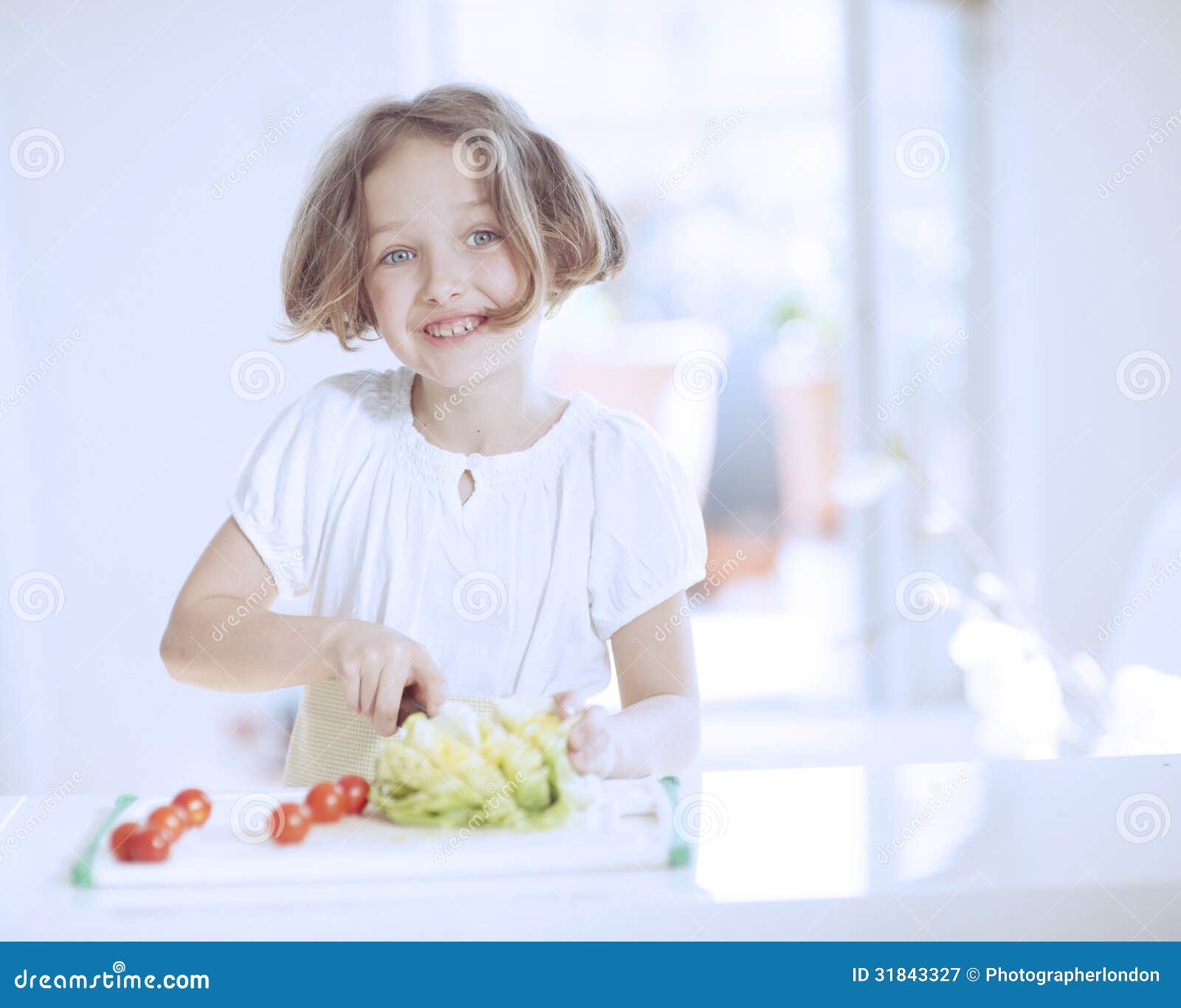 Young girl making a salad stock image. Image of short - 31843327