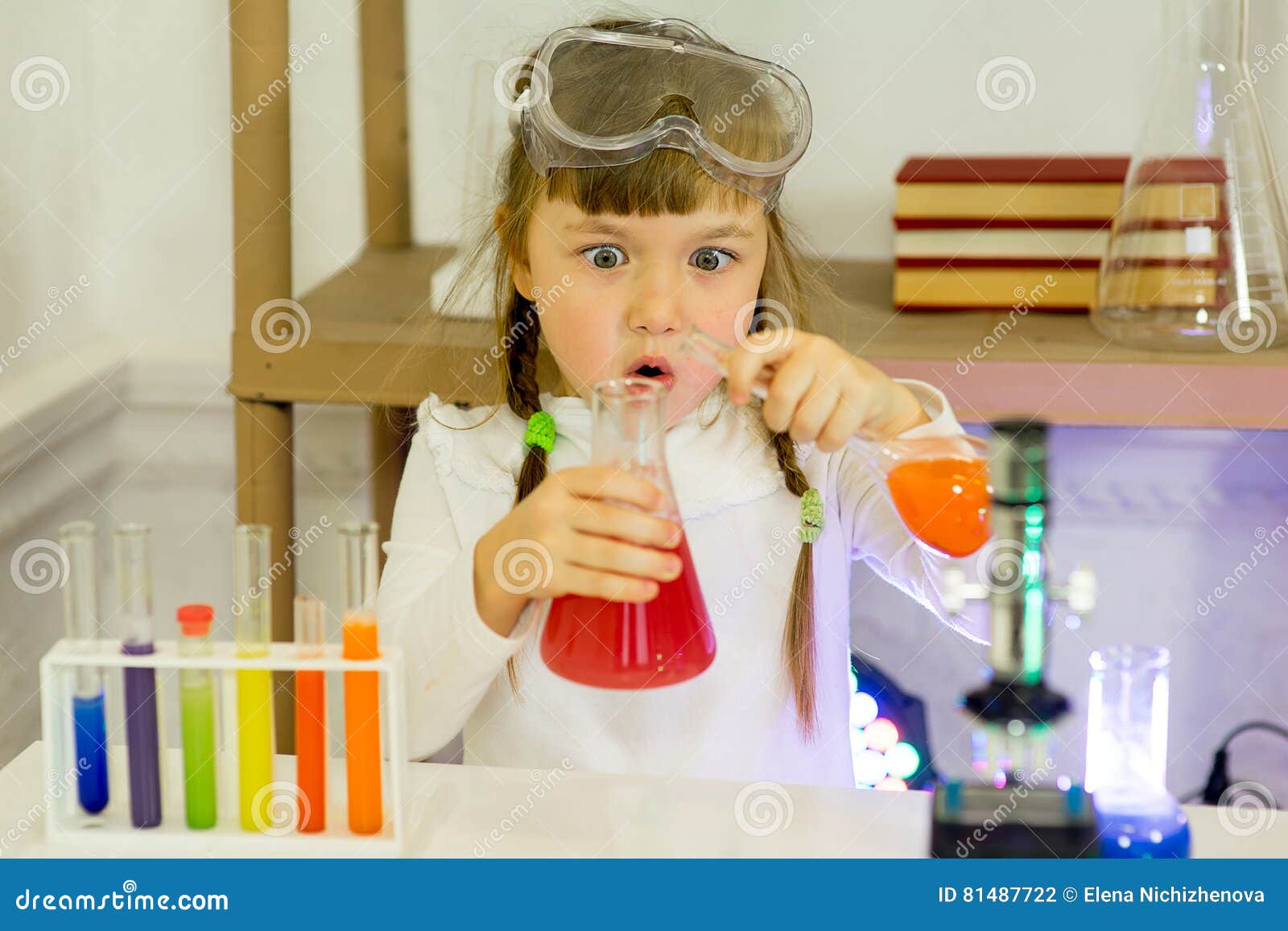 Young Girl Making Science Experiments Stock Photo - Image of bottle ...