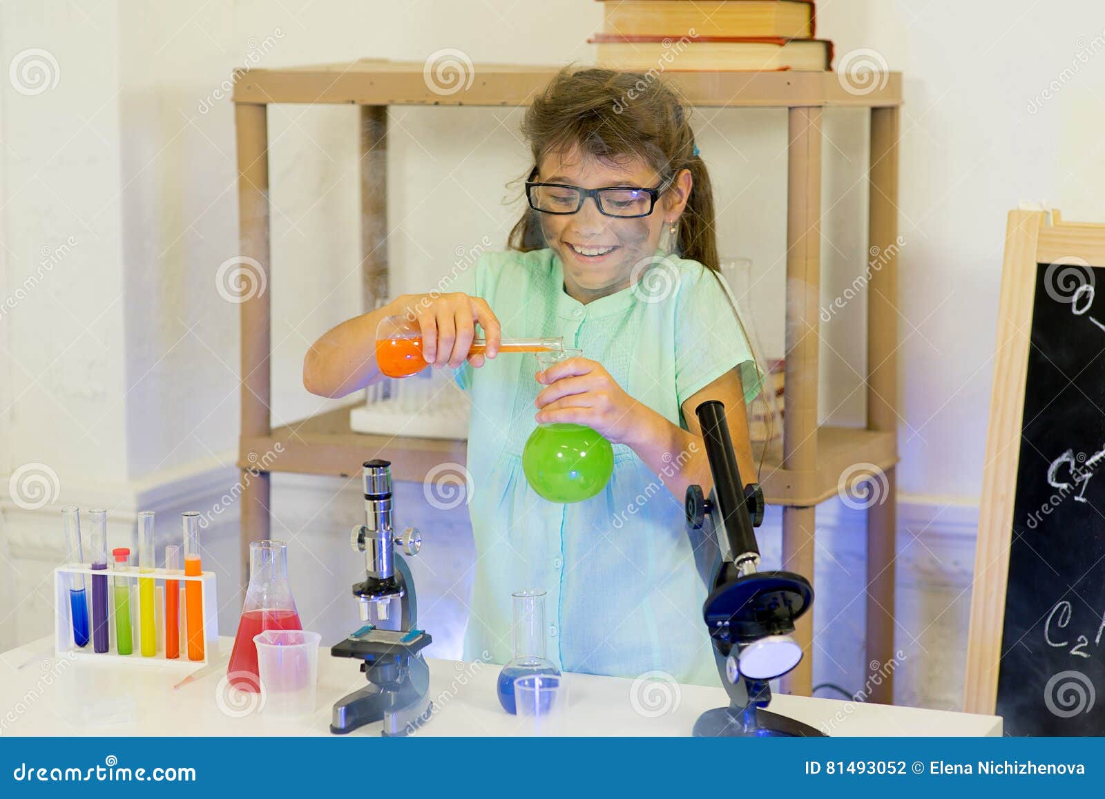 Young Girl Making Science Experiments Stock Photo - Image of analyzing ...
