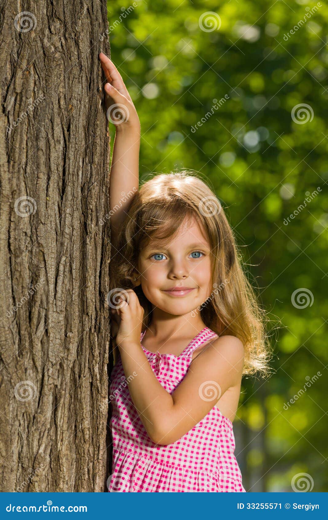 Young girl near a tree stock image. Image of happiness - 33255571