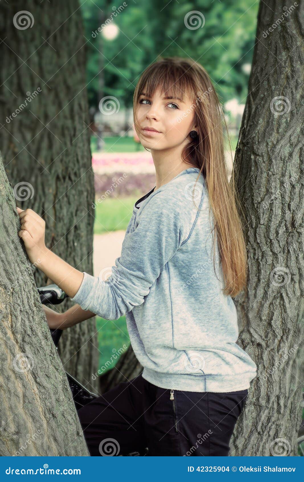 Young girl near a tree stock photo. Image of beautiful - 42325904
