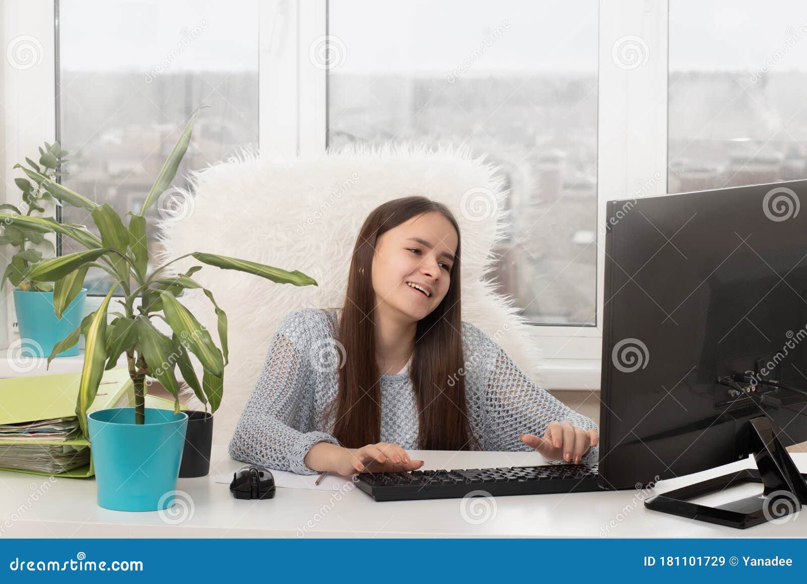 Young Girl Office Worker at a Computer at Home during Coronavirus ...