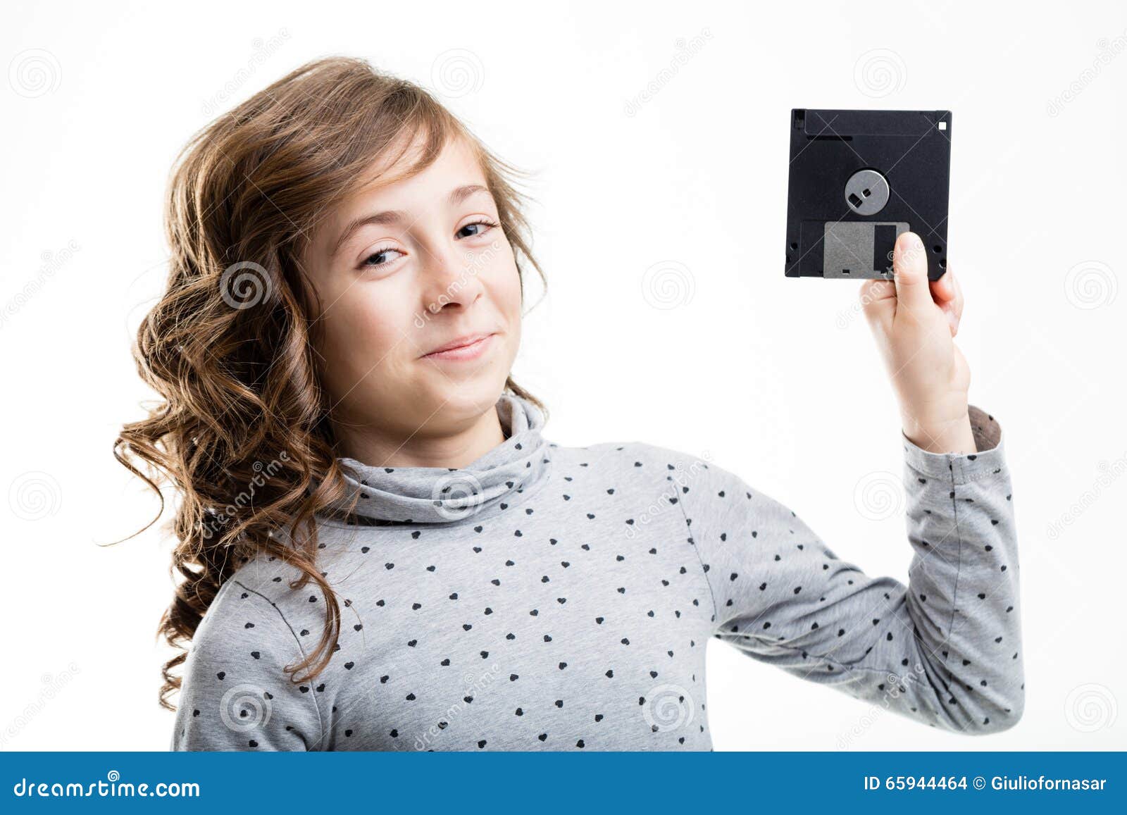 Young girl with old disk stock photo. Image of holding - 65944464
