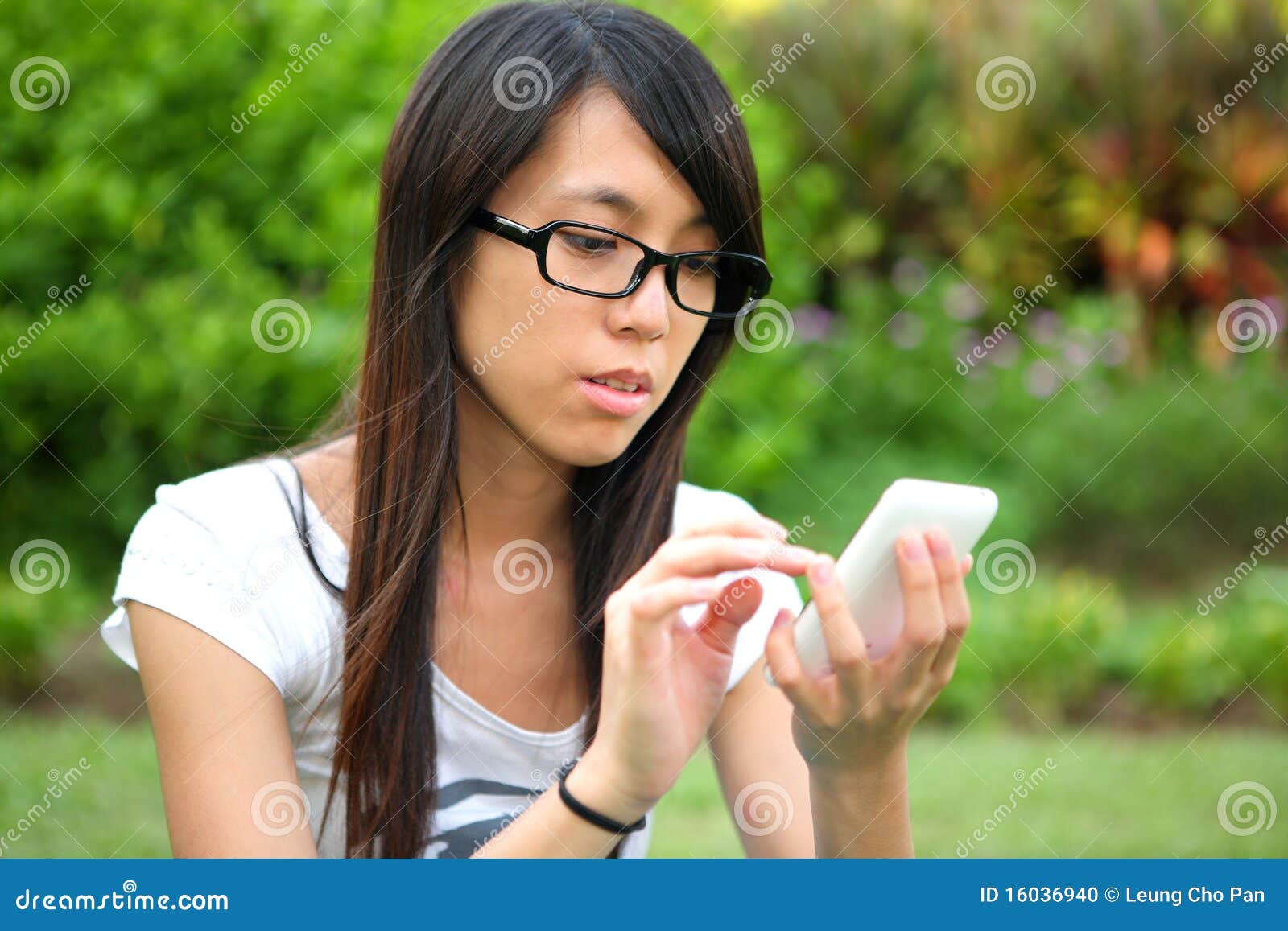 Young Girl with Pda Outdoor Stock Photo - Image of message, color: 16036940