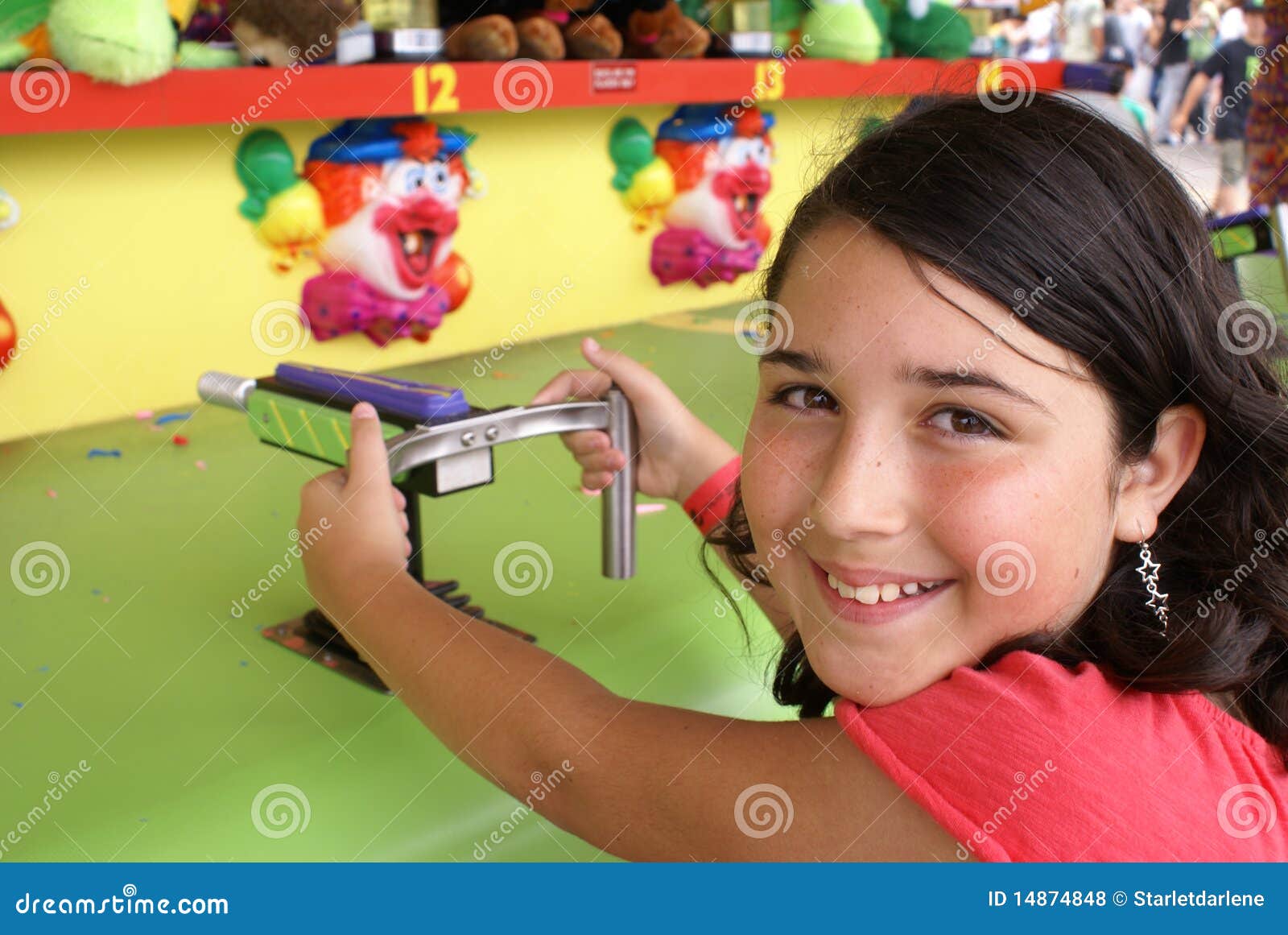 Young Girl Playing a Game at Fair or Carnival Stock Photo - Image of ...