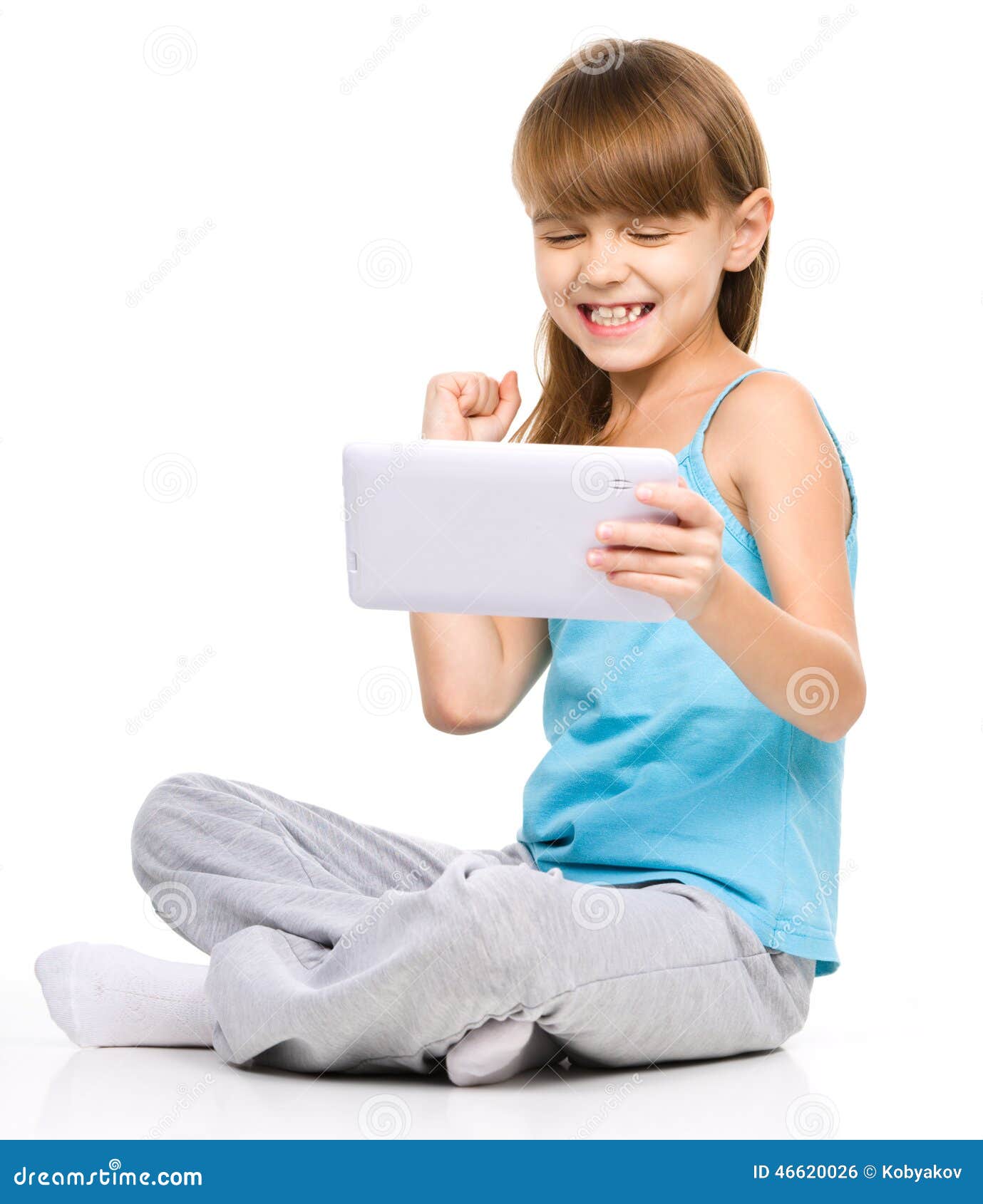 Young Girl is Playing Game Using Tablet Stock Photo - Image of computer ...