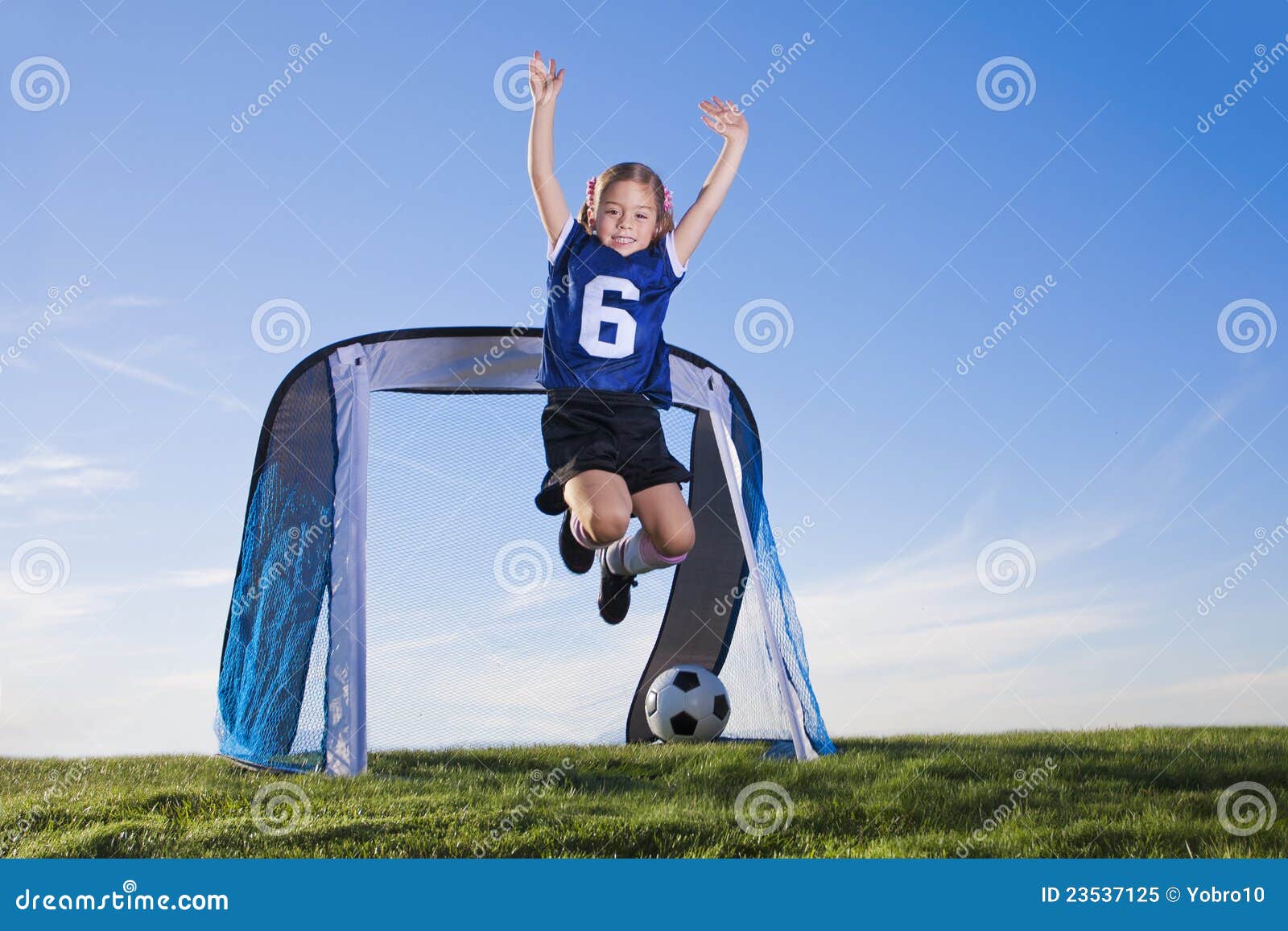 Young Girl Playing Soccer and Scoring Goal Stock Image - Image of ...