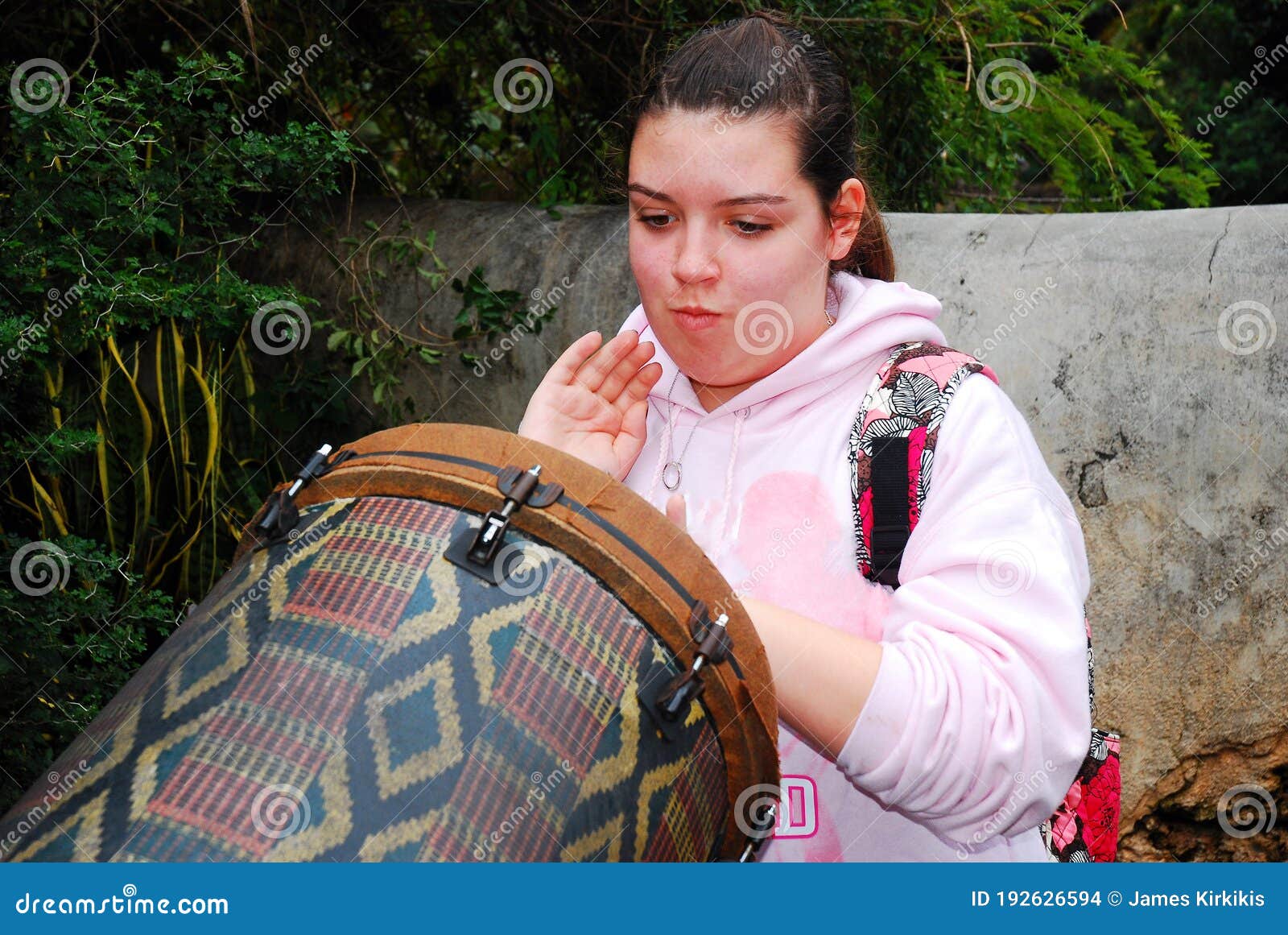 A Young Girl Plays on an African Style Bongo Stock Photo - Image of ...