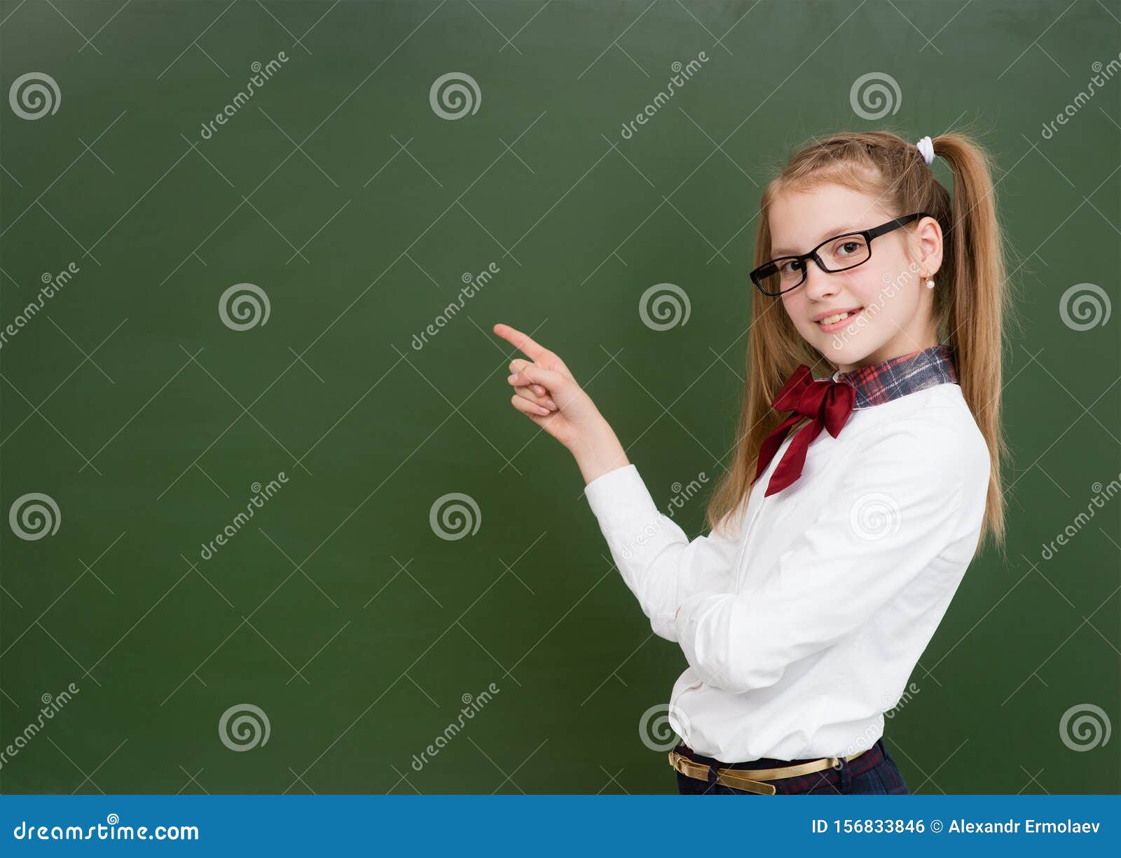 Young Girl Points on Empty Green Chalkboard Stock Photo - Image of ...