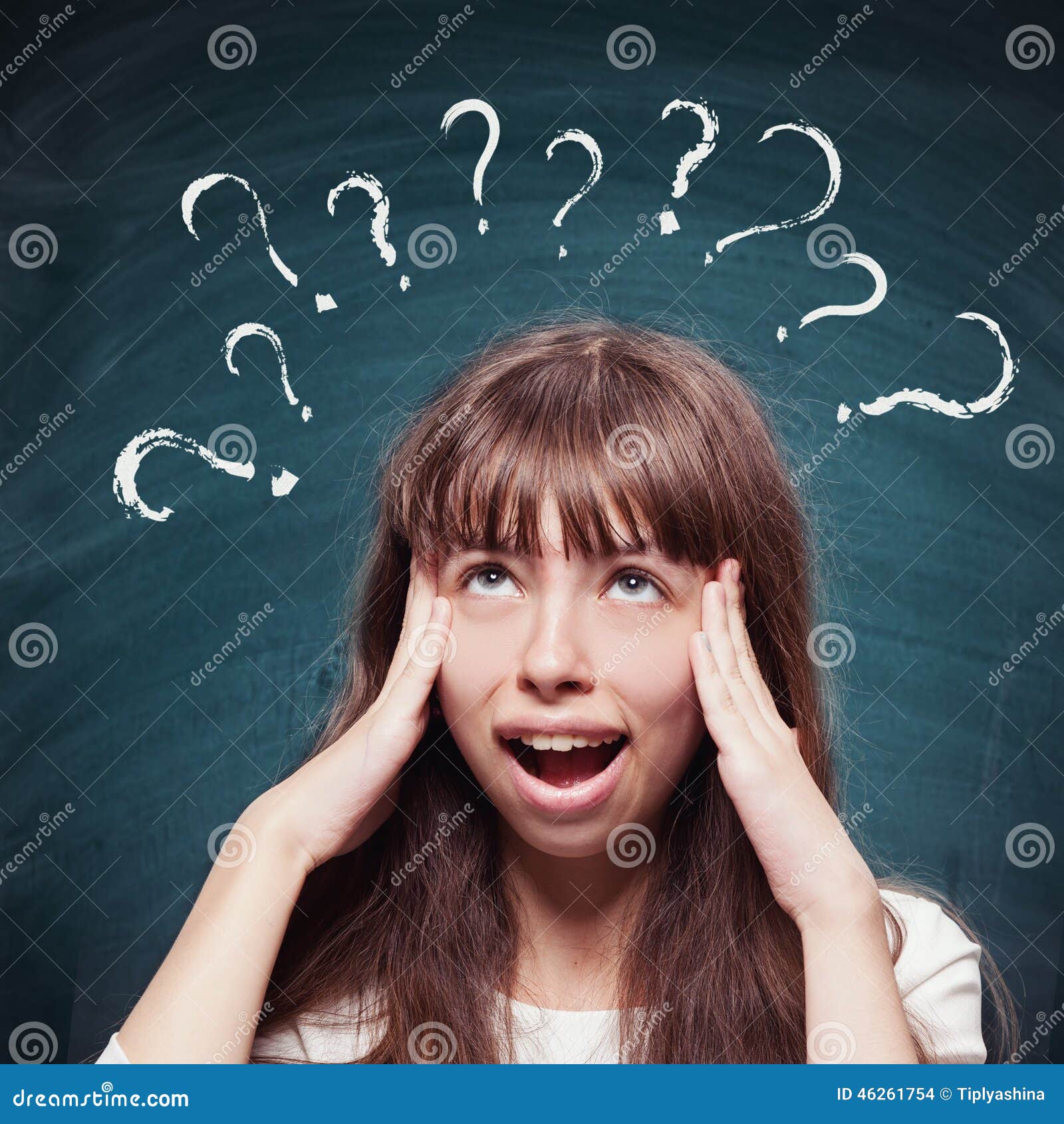 Young Girl with Questioning Expression and Question Marks Above Stock ...