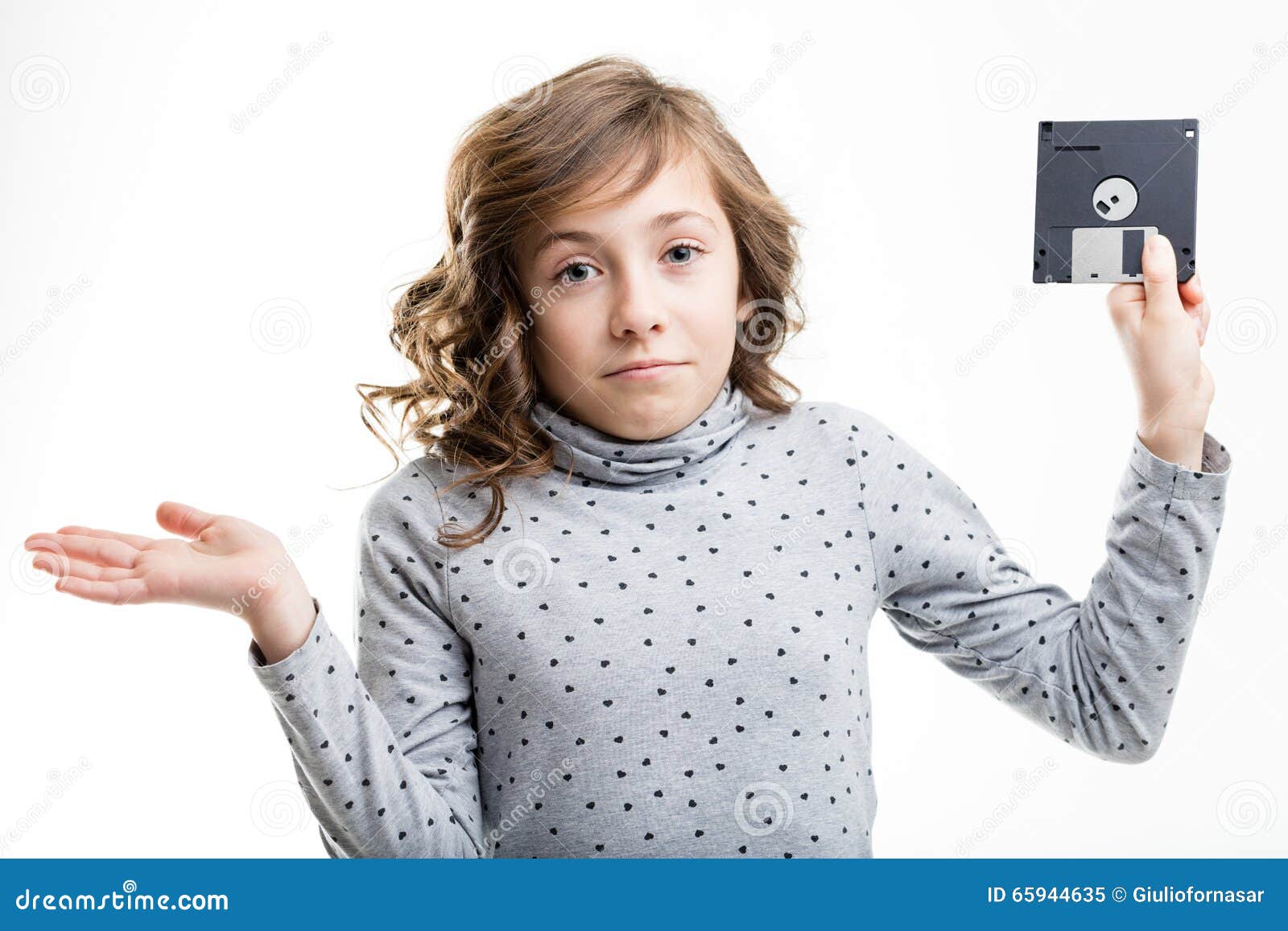 Young Girl Questioning Floppy Disk Stock Image - Image of confused ...