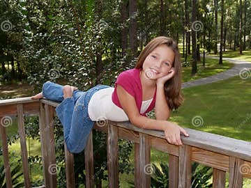 Young Girl on Railing stock photo. Image of preteen, railing - 7331574