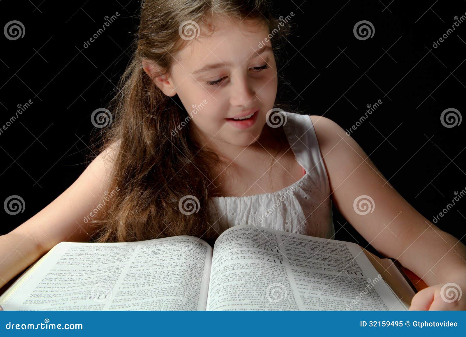 Young Girl Reading Bible stock image. Image of dress - 32159495